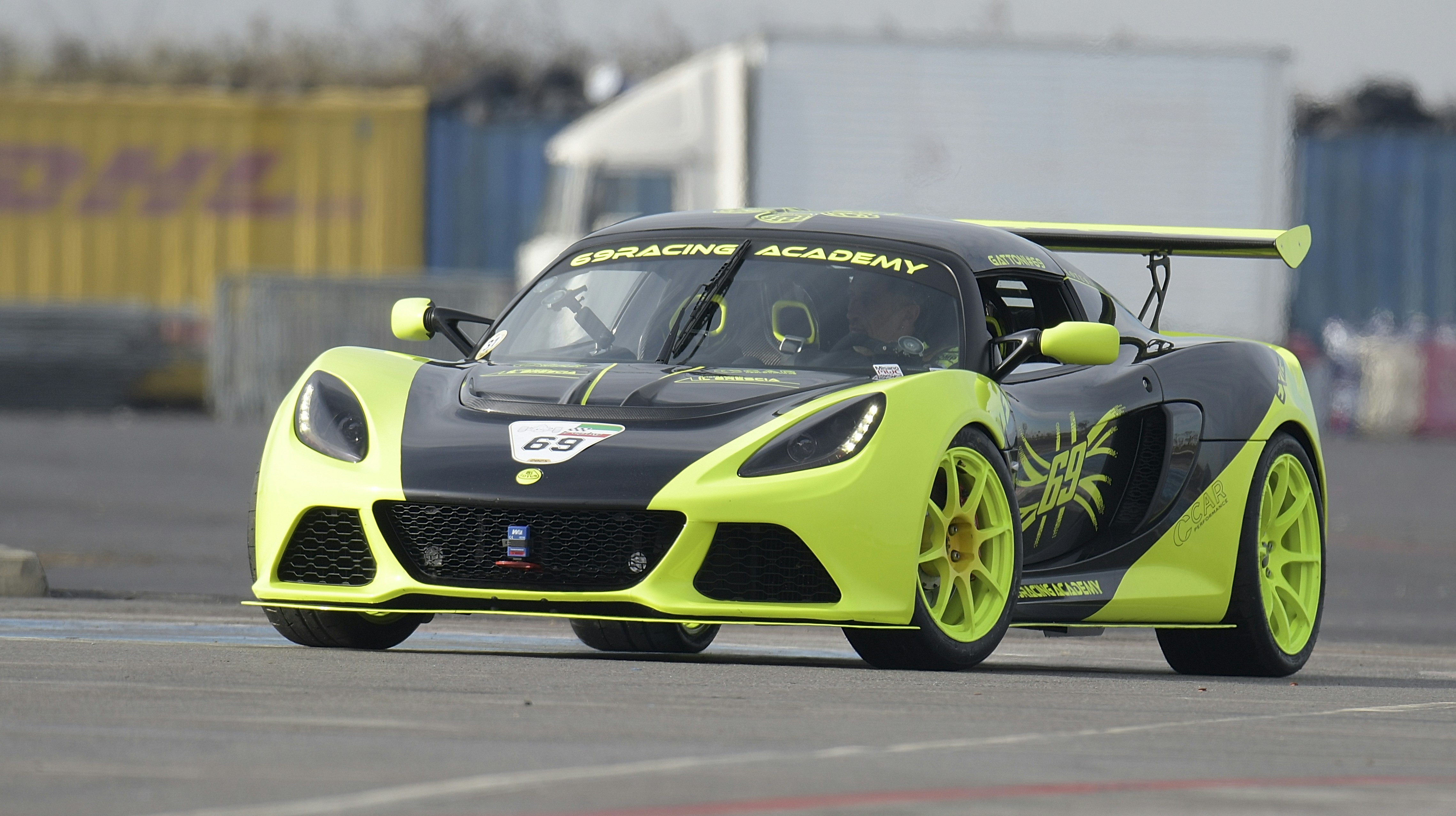 Lime Lightning on the Circuit: A Neon-Green GT Racer in Full Tilt