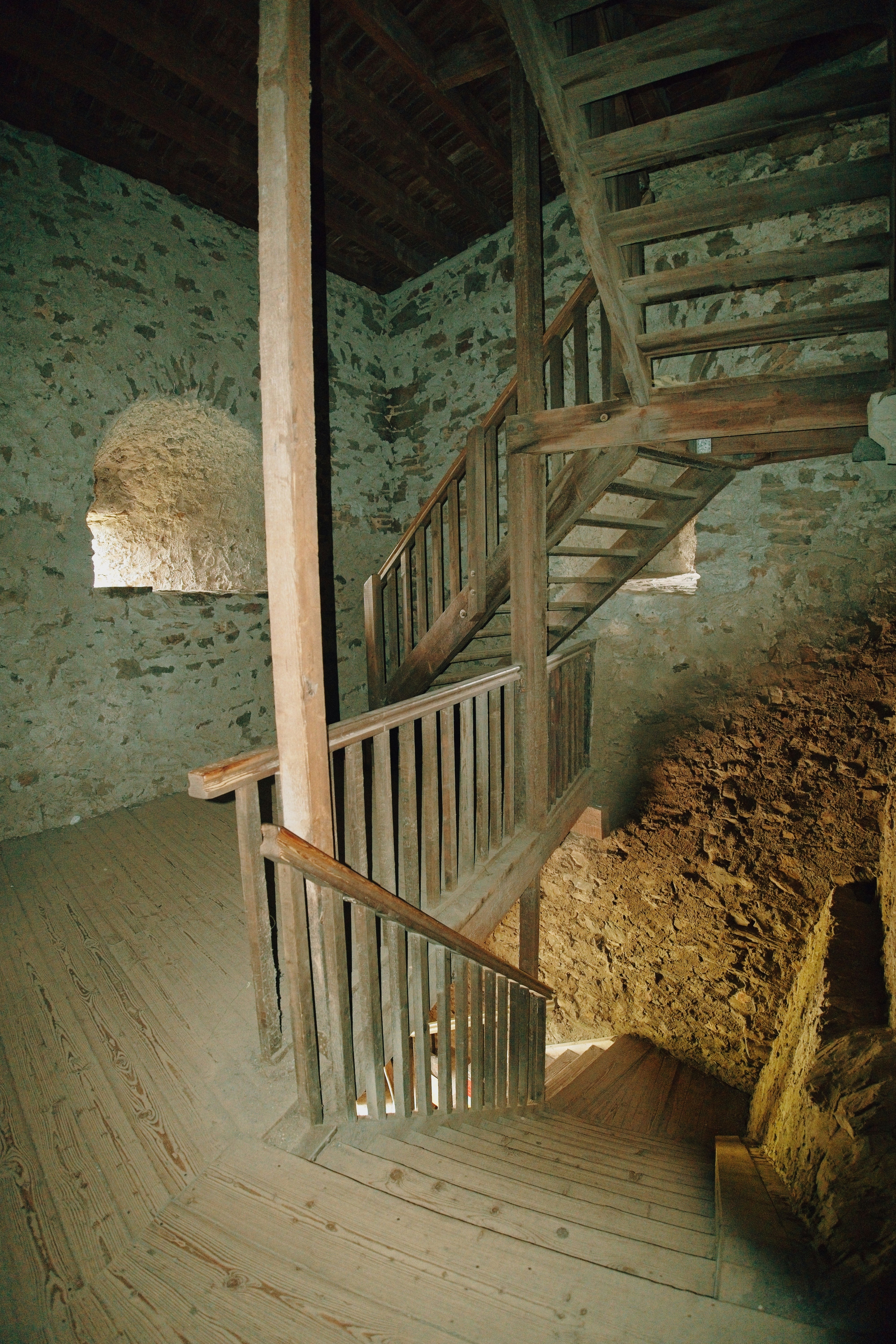 Timber Spine Winding Through Stone