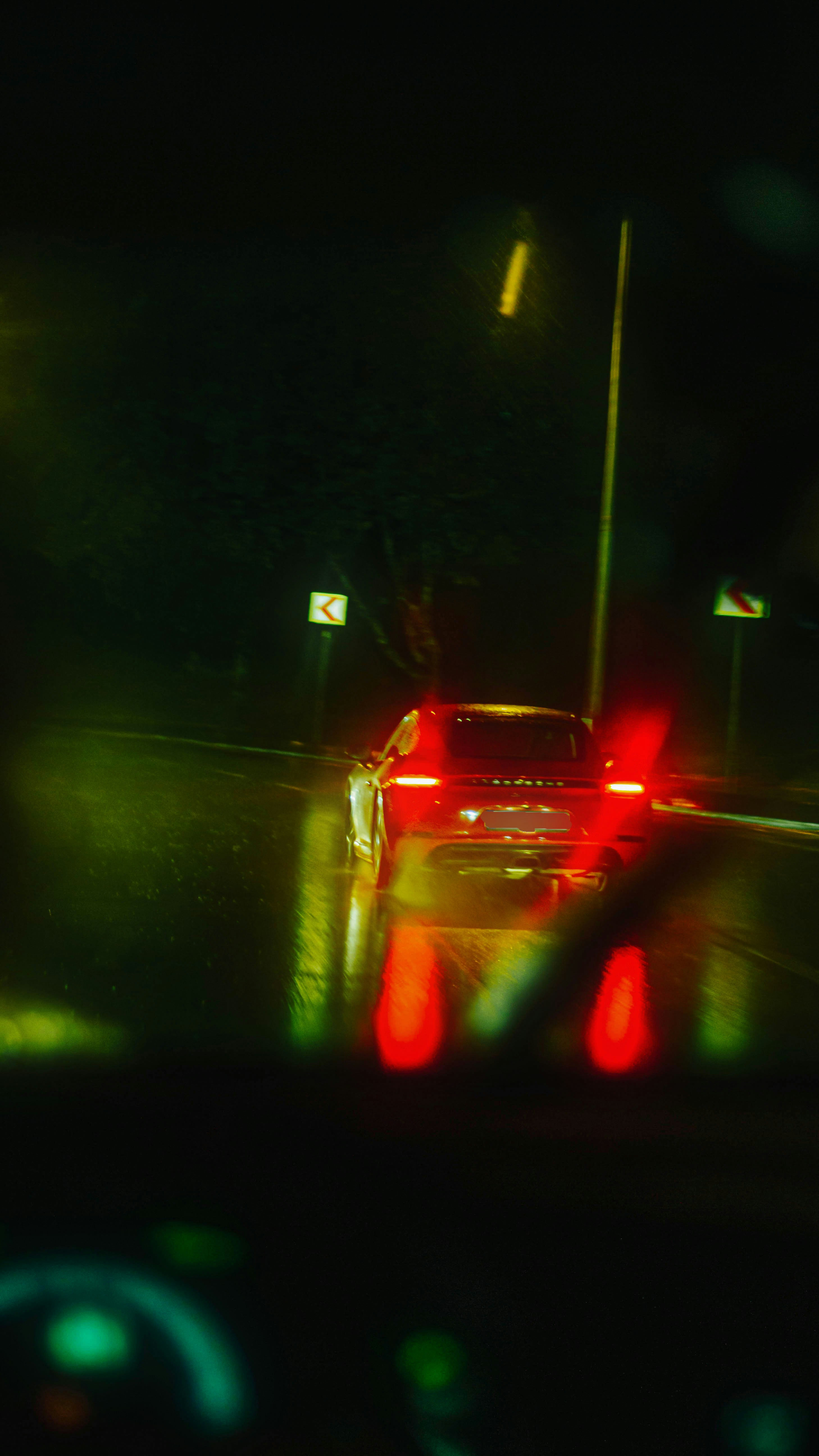 Porsche Tail Lights in the Downpour