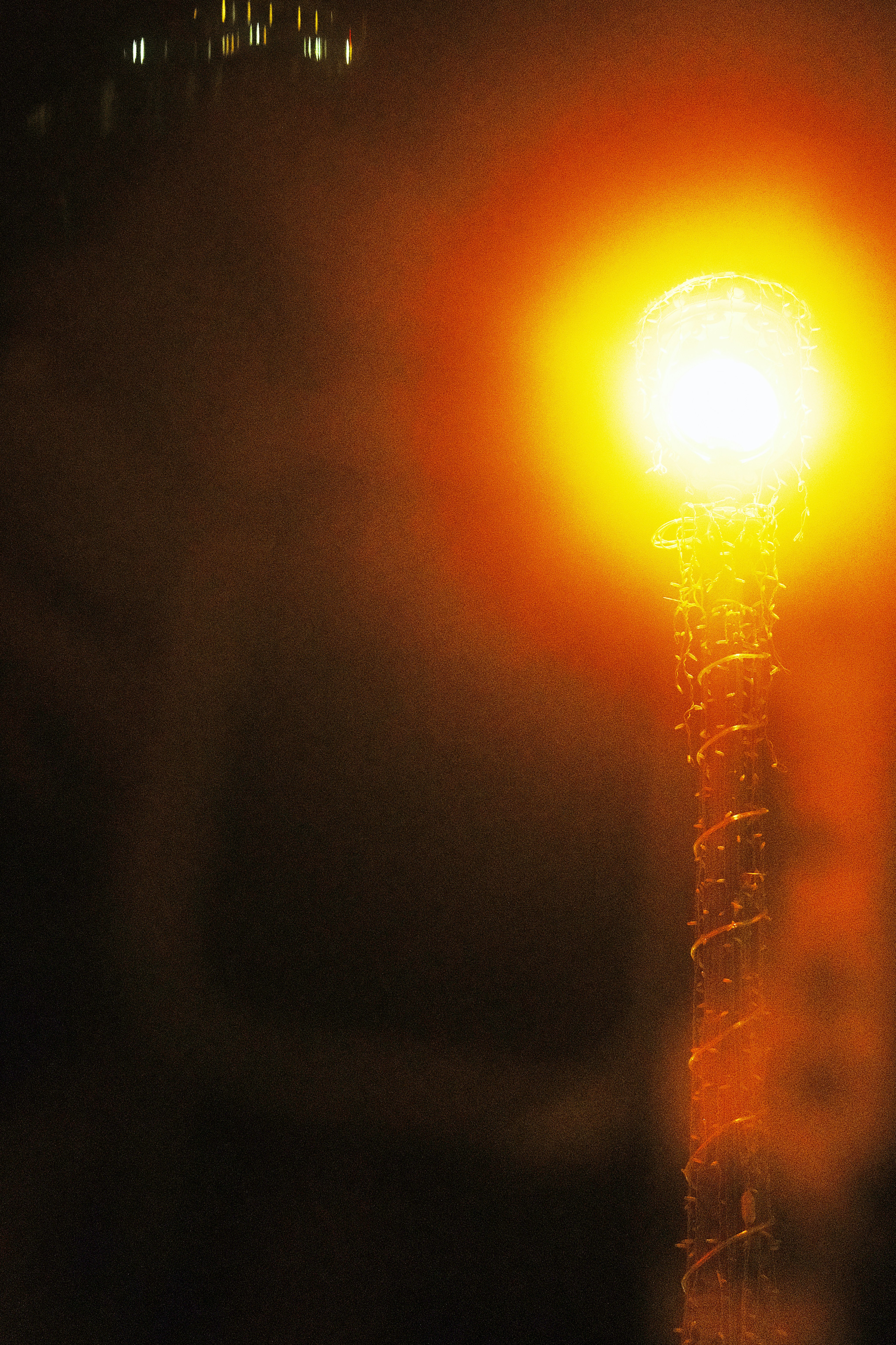 Amber Beacon on the Edge of Night