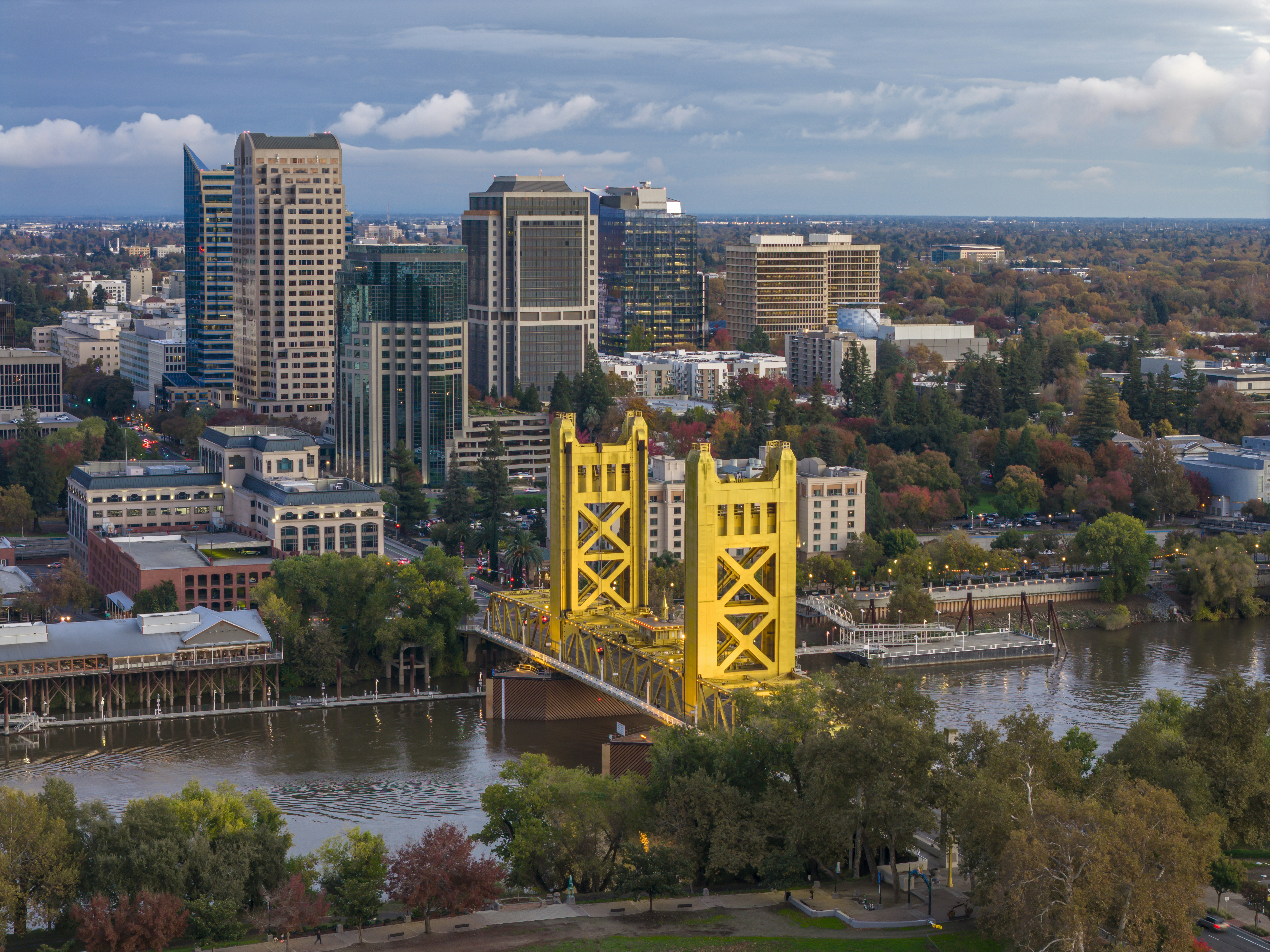 Golden Bridge Towers Rise Over the River City