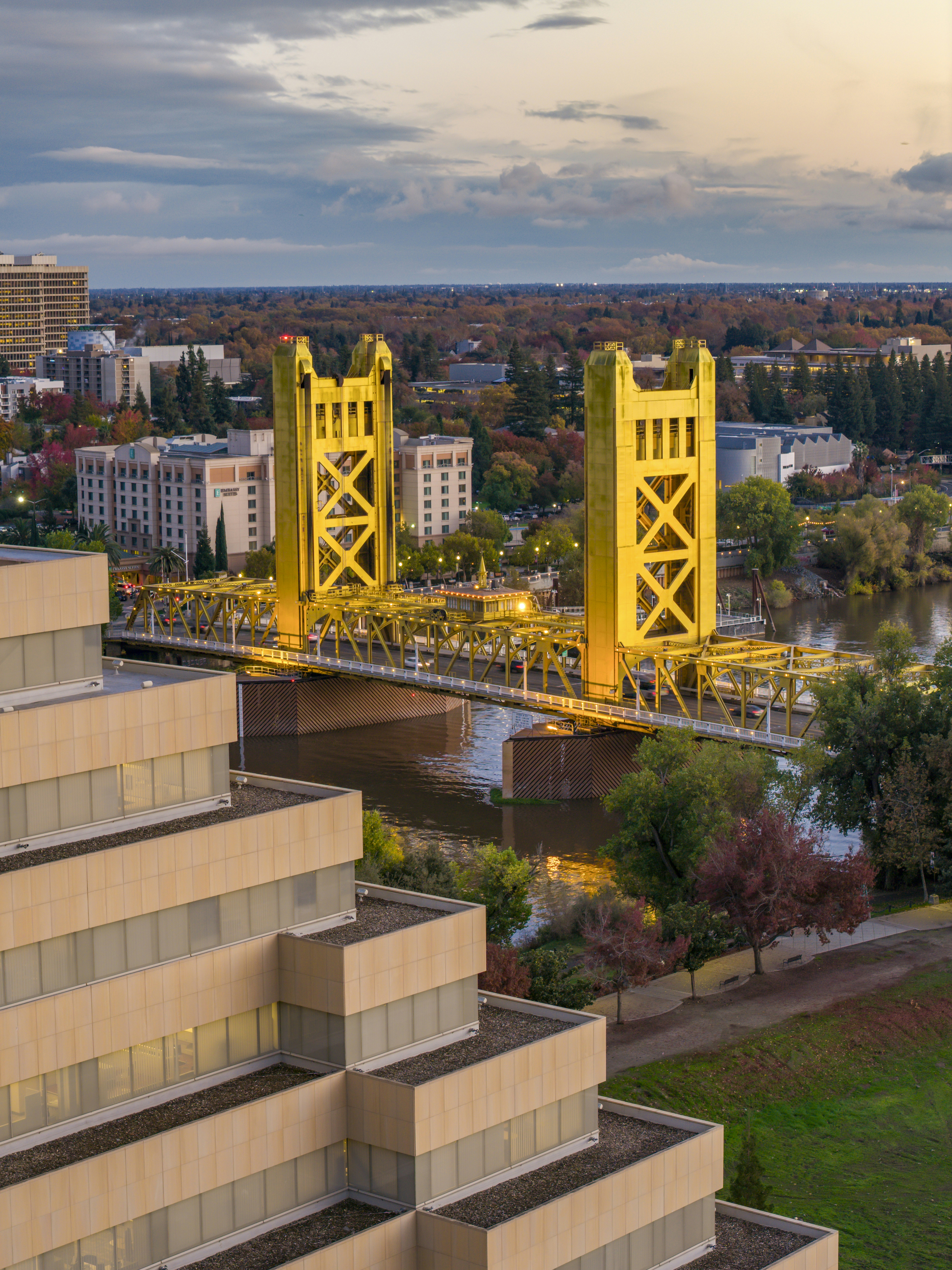 Golden Towers Over the Riverside Bridge at Dusk