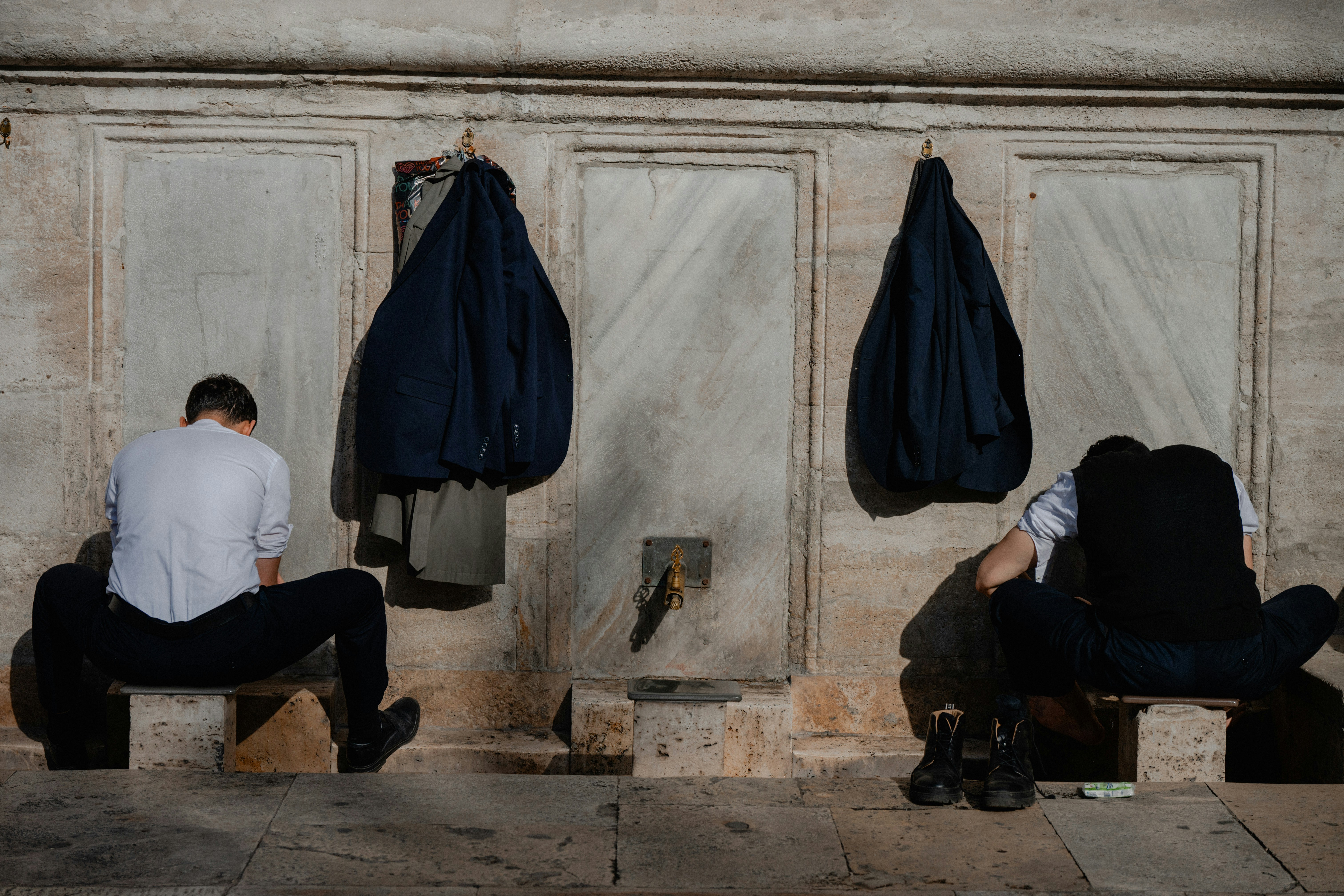 Two Quiet Refuges: Shadows in a Stone Locker Room