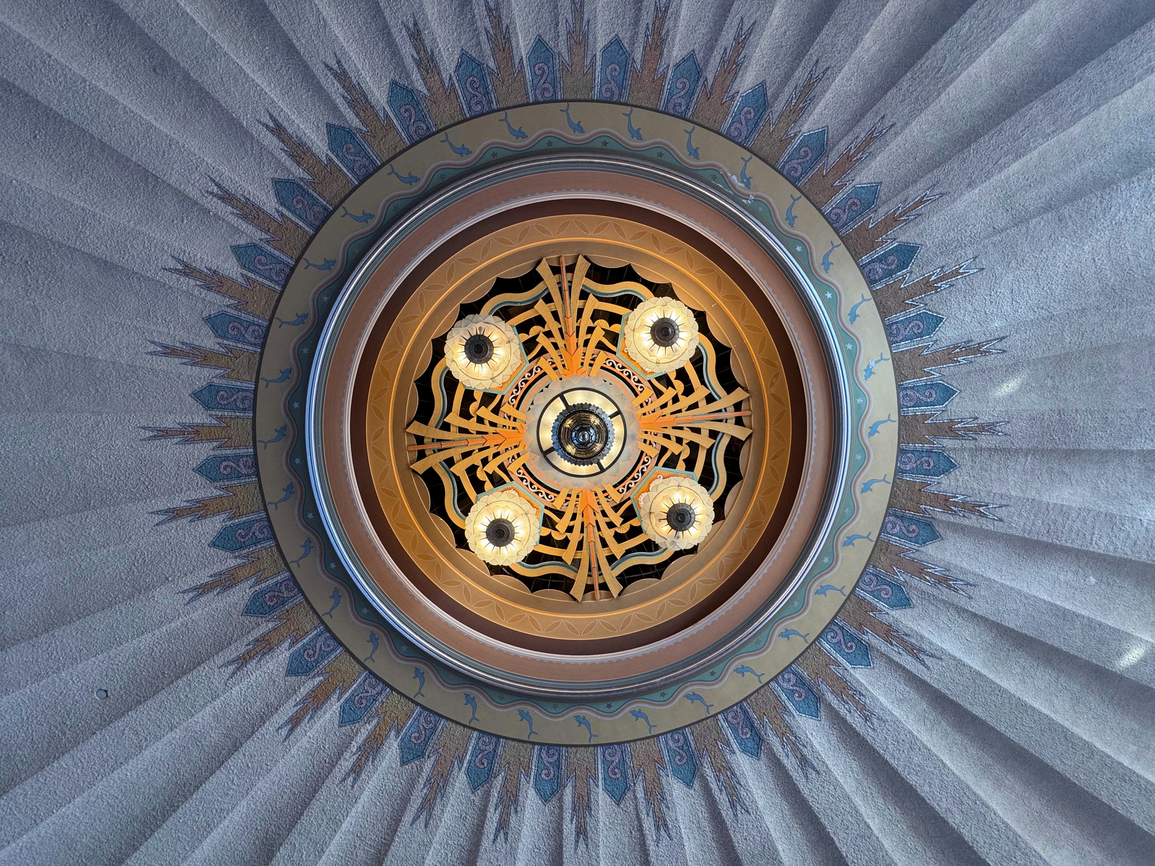 Circular Crown of Light: A Golden Mandala at the Ceiling's Core