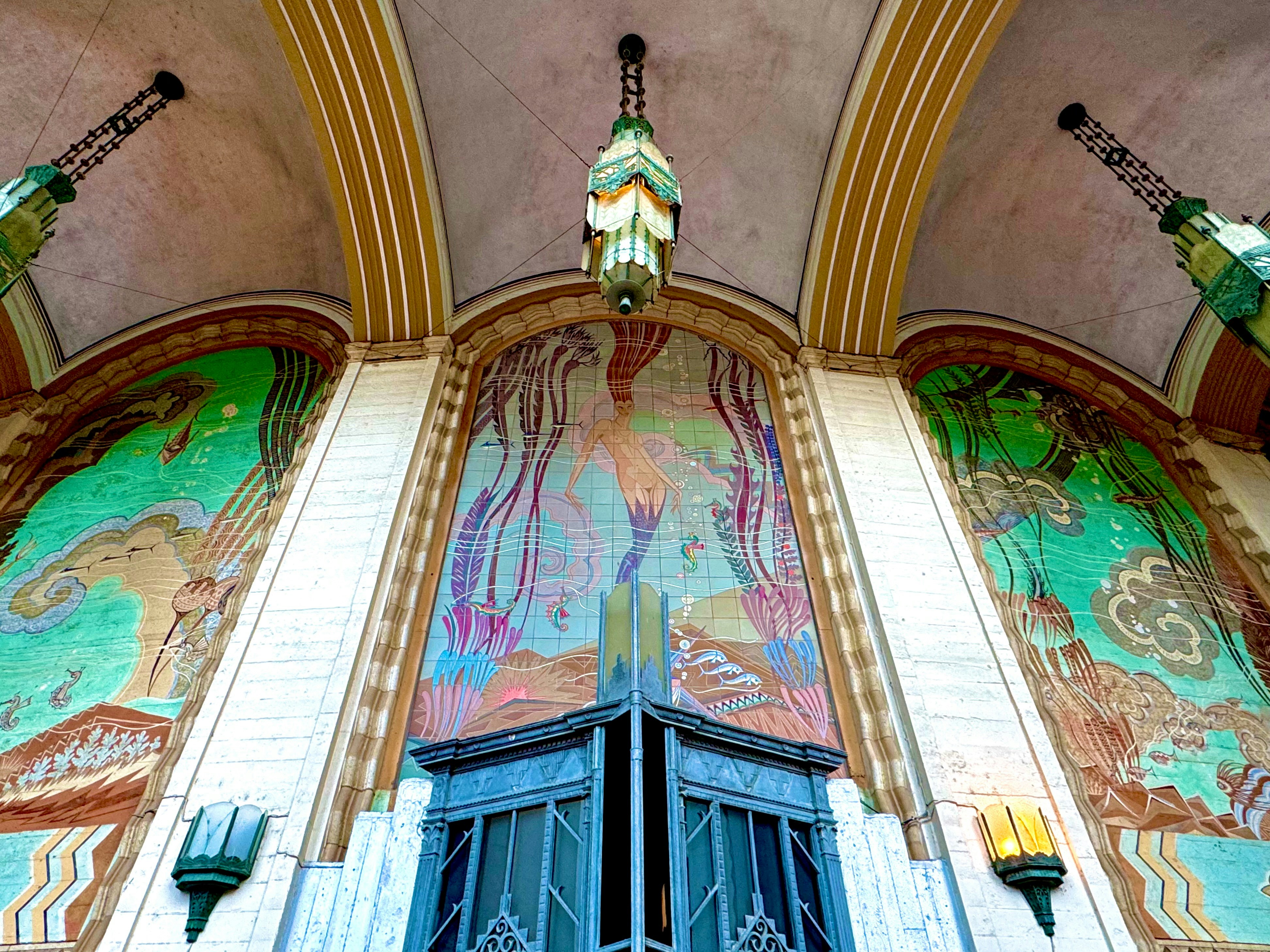Cerulean Gate Between Painted Arches