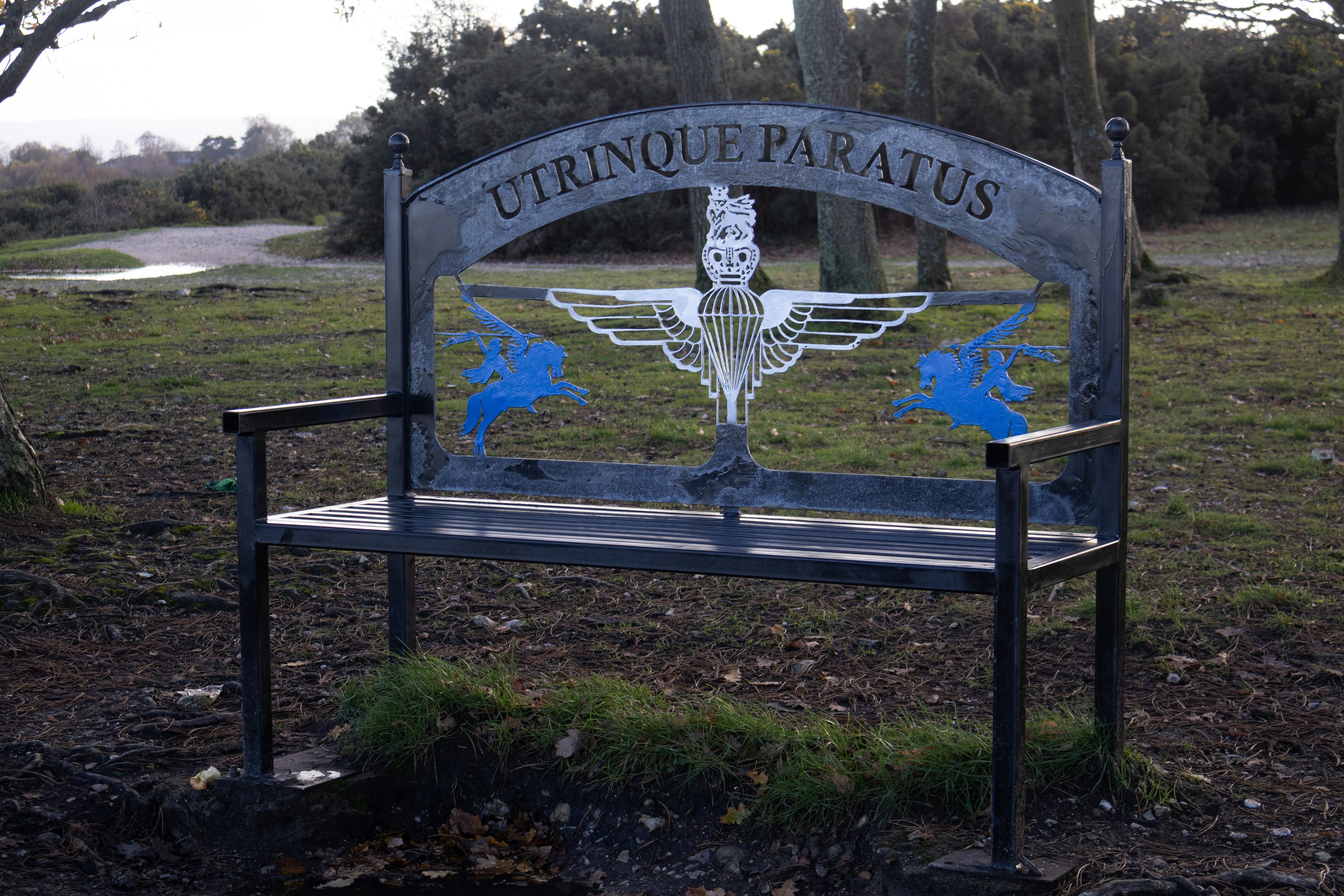 Winged Emblem Over a Quiet Park Bench