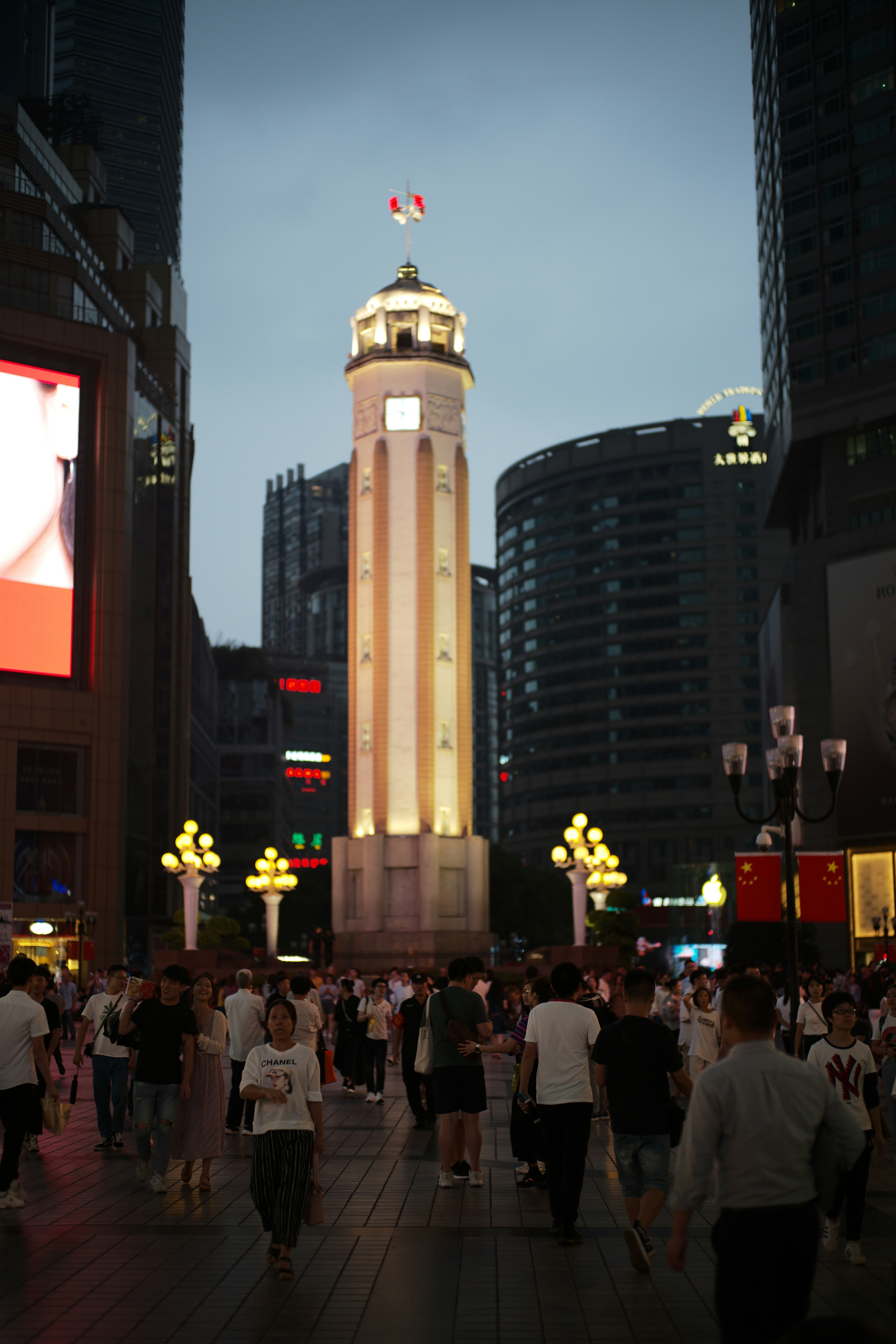 Tower of Time at Dusk: A Crowded City Square