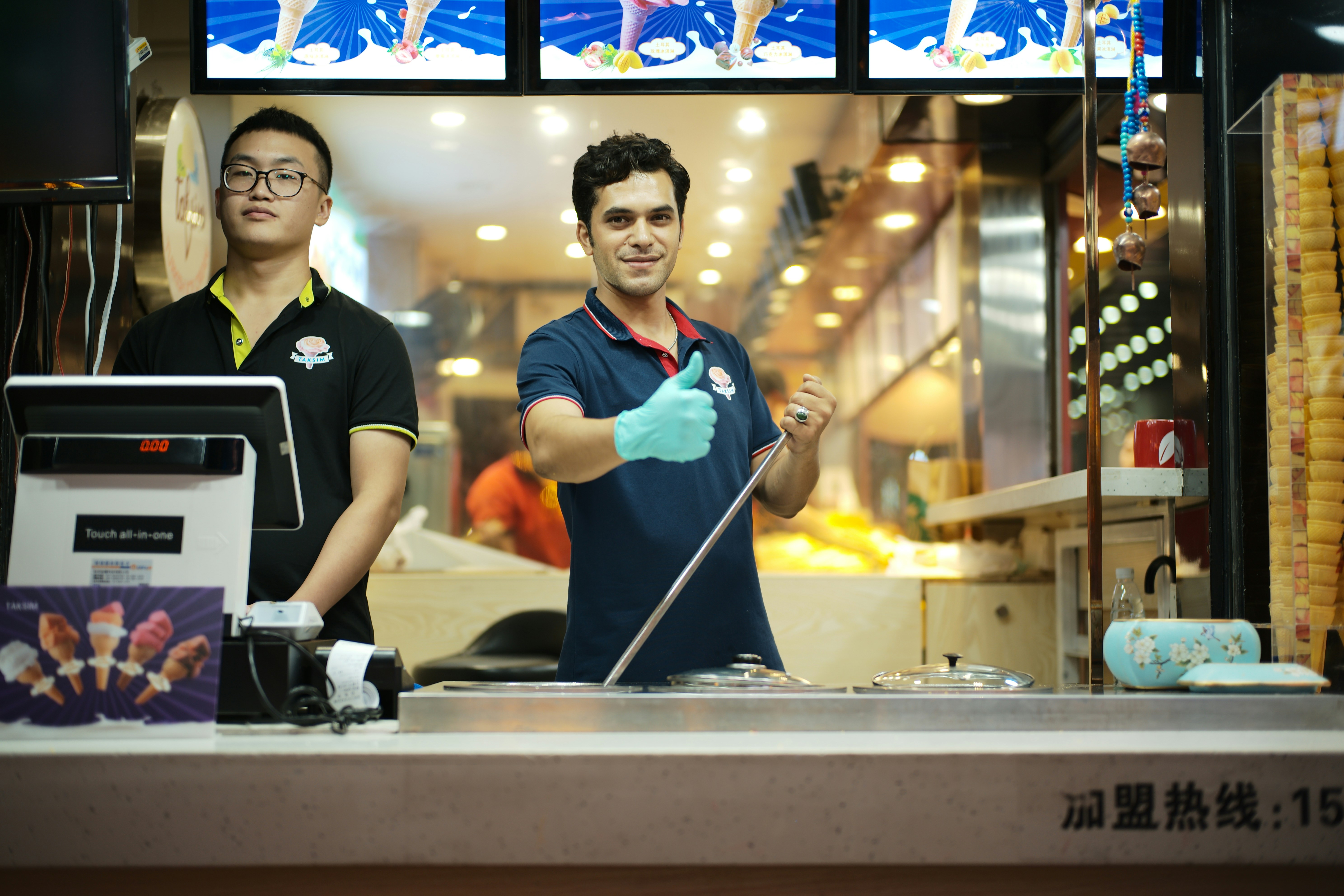 Thumbs Up at the Counter: A Street-Food Moment