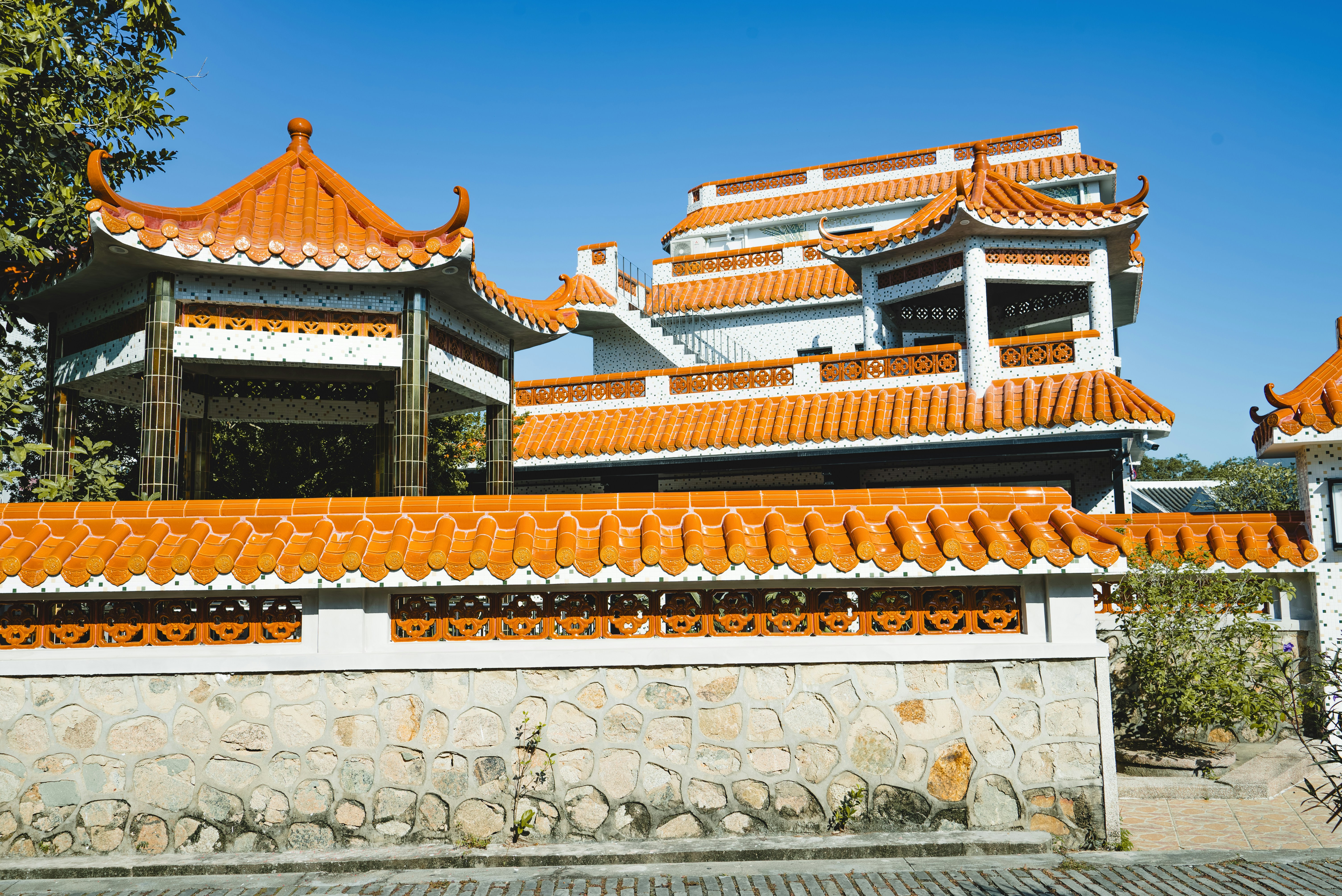 Terracotta Rooflines Over a Quiet Stone Courtyard