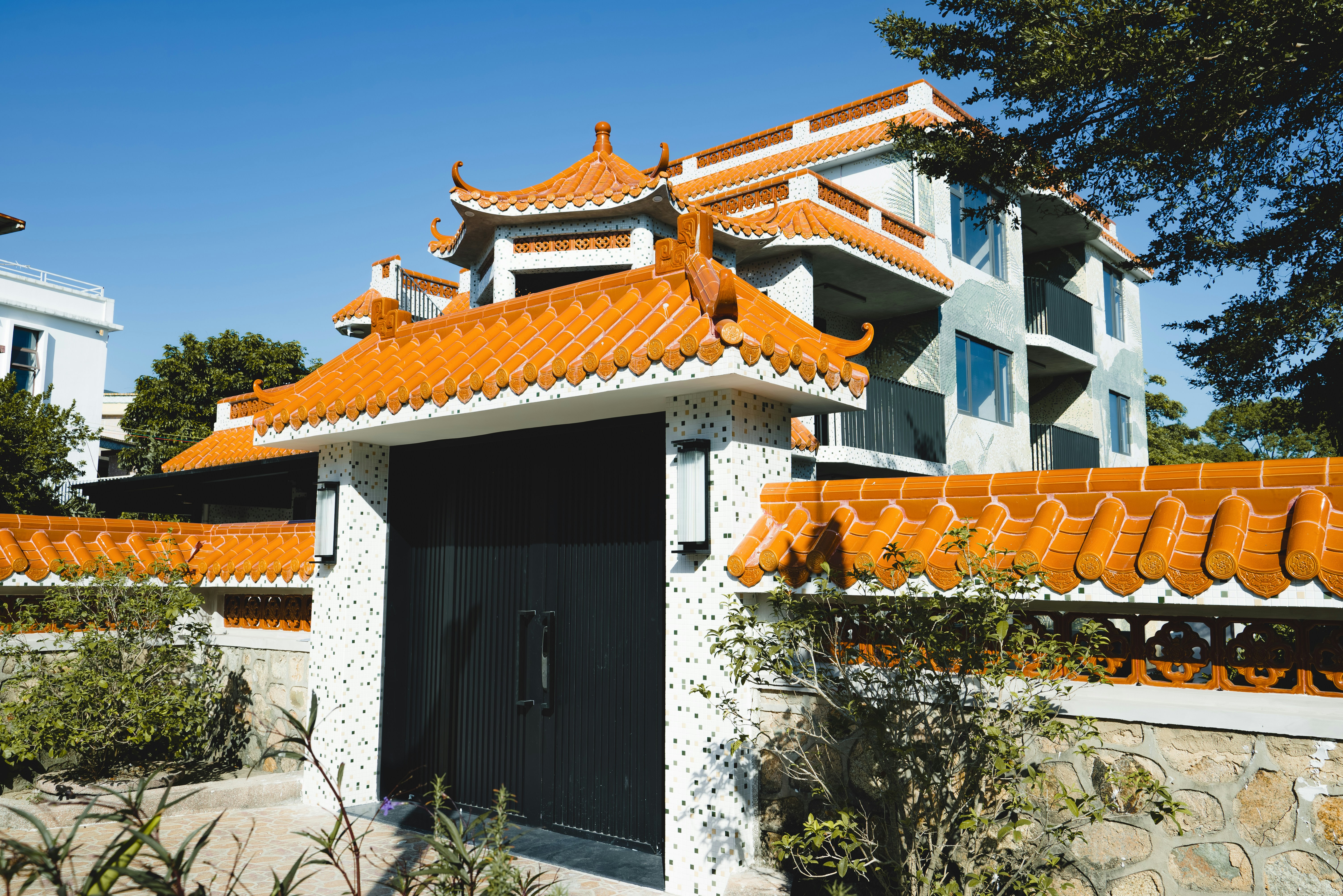 Tile-Topped Gatehouse Under a Blue Sky