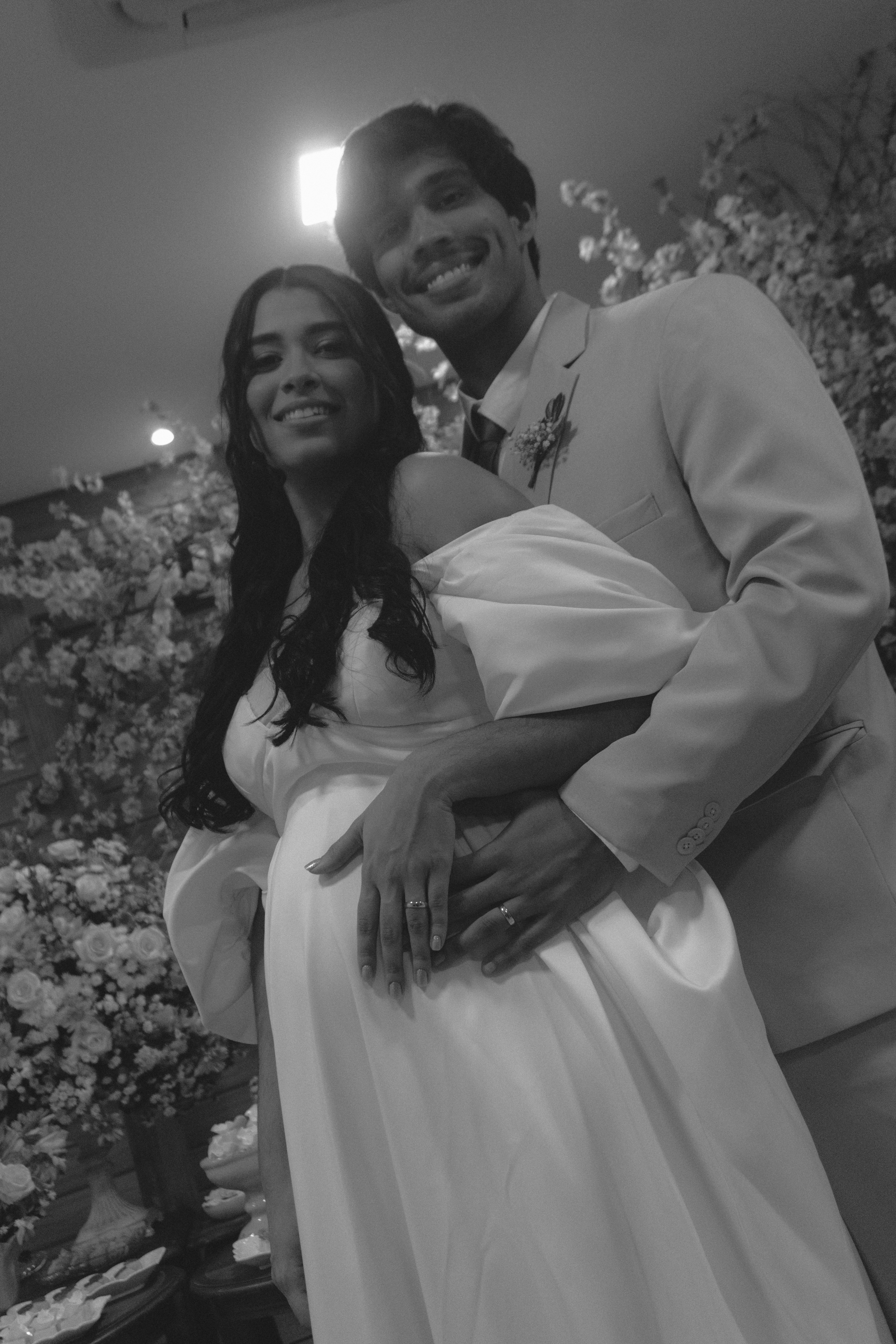 Monochrome Moment: A Wedding Portrait Amid Florals