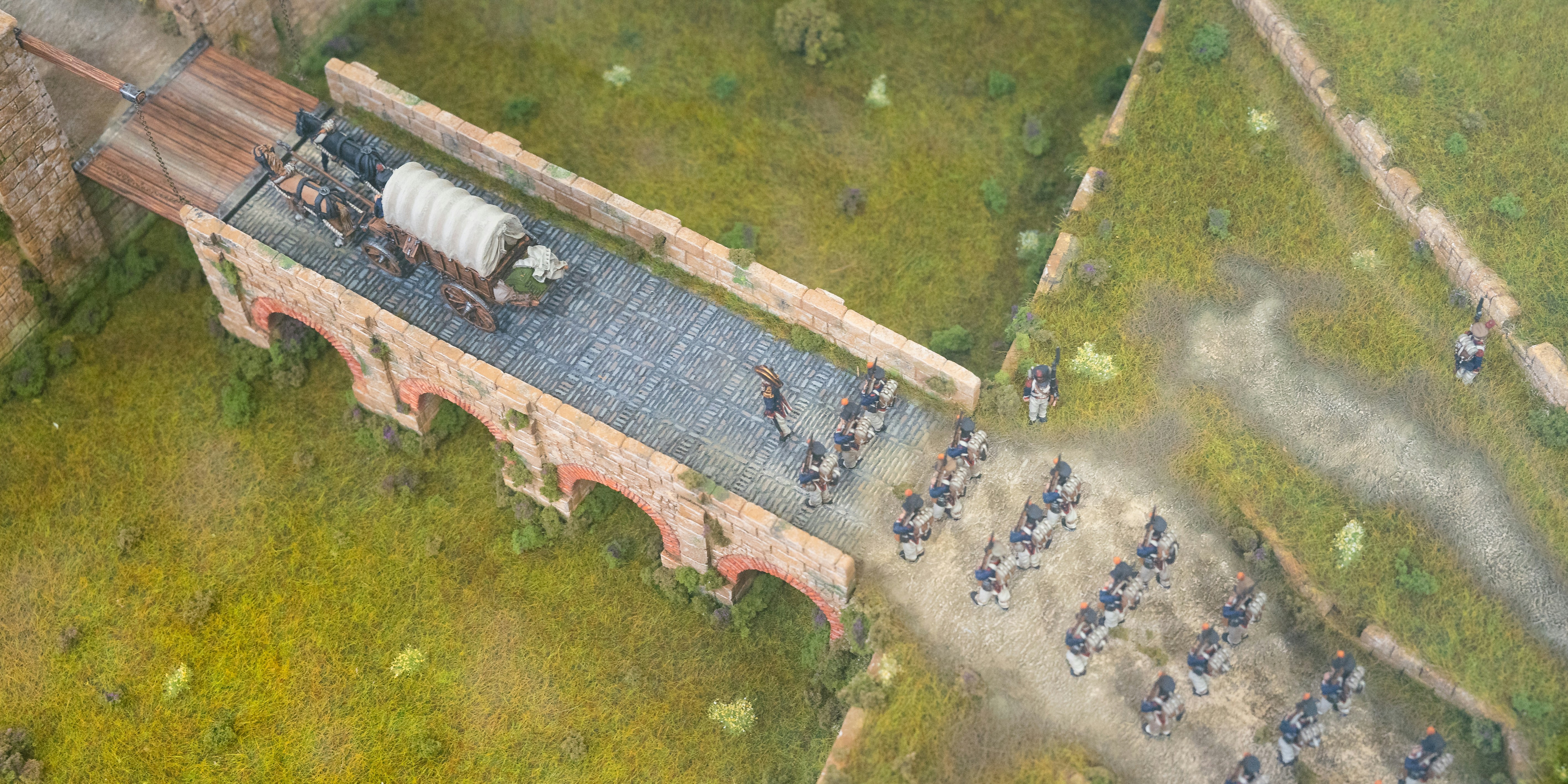 Soldiers crossing a stone bridge with a wagon photo – Free Stone bridge ...