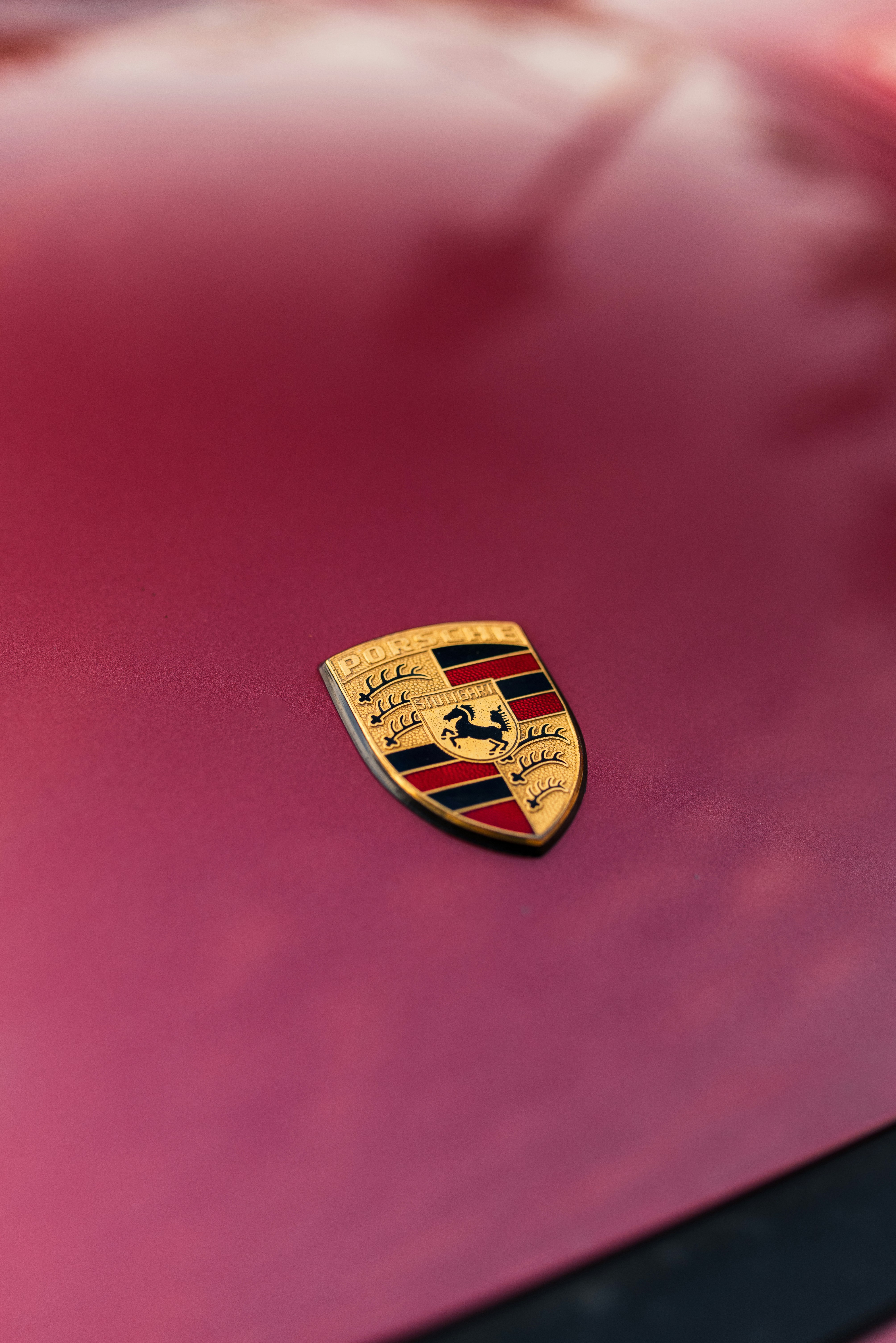 Porsche Crest on a Velvet Magenta Hood