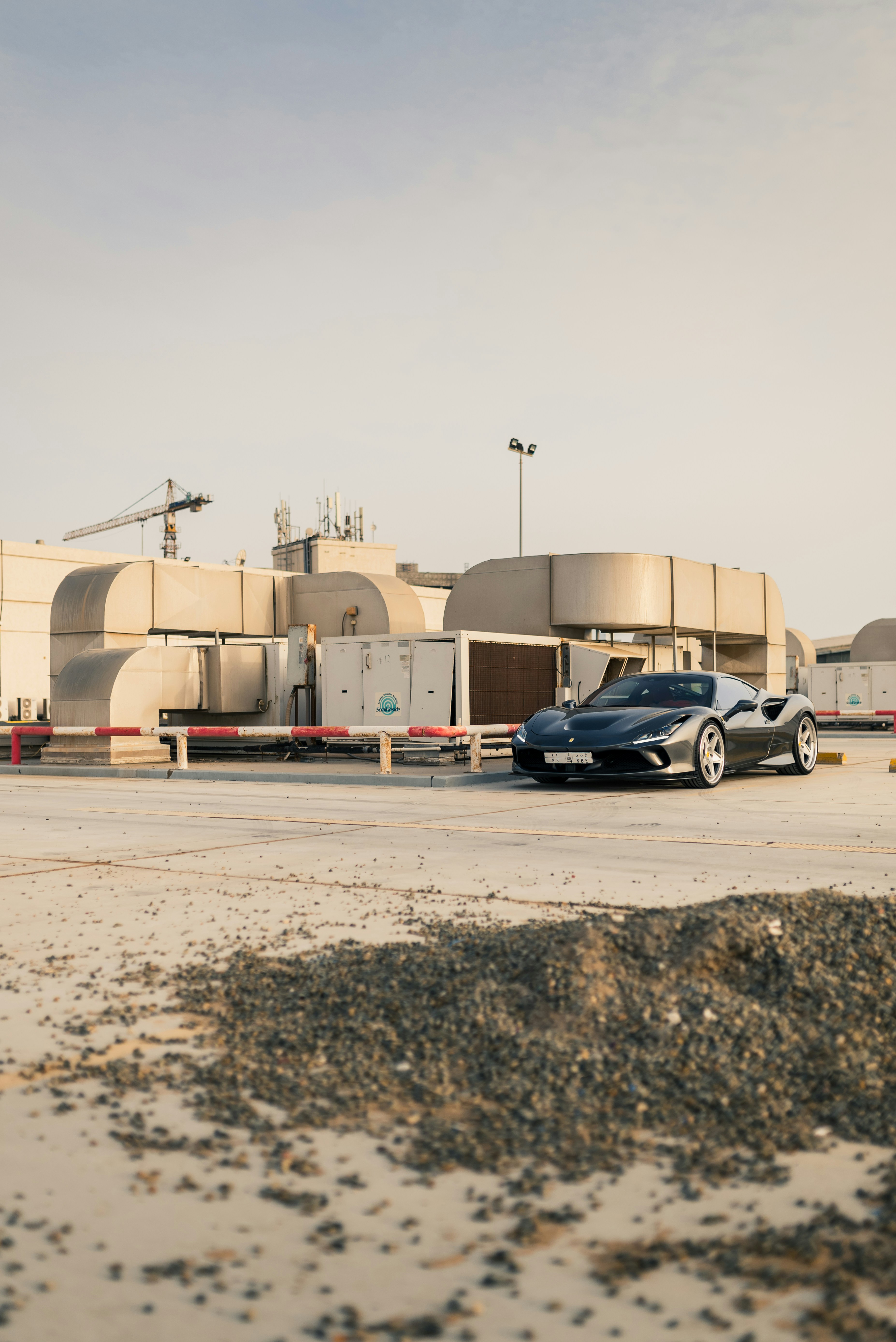 Chrome on Concrete: A Supercar Holds Court on an Industrial Rooftop