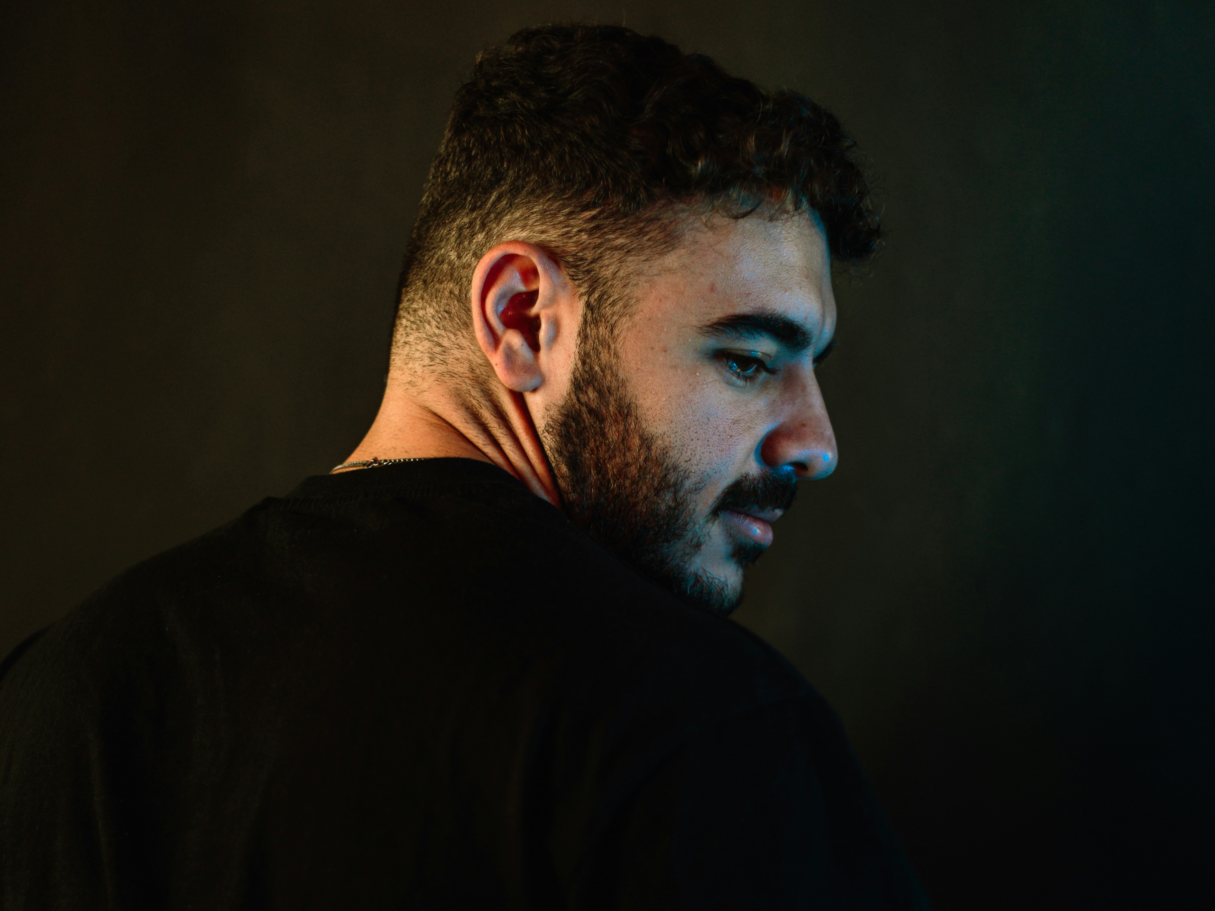 Velvet Shadows: A Quiet Profile Portrait
