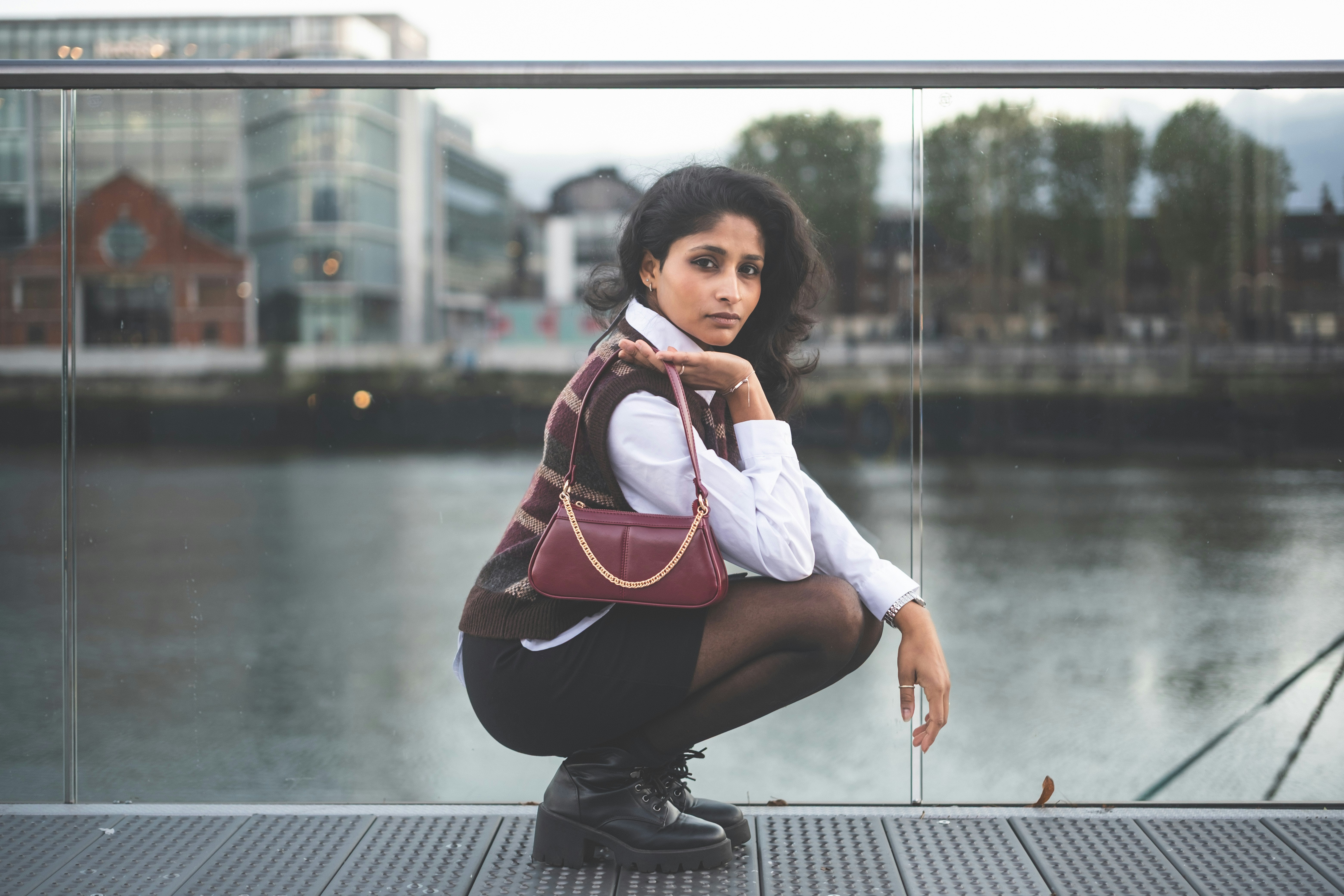Glassy Edge: A Quiet Pose by the Riverfront