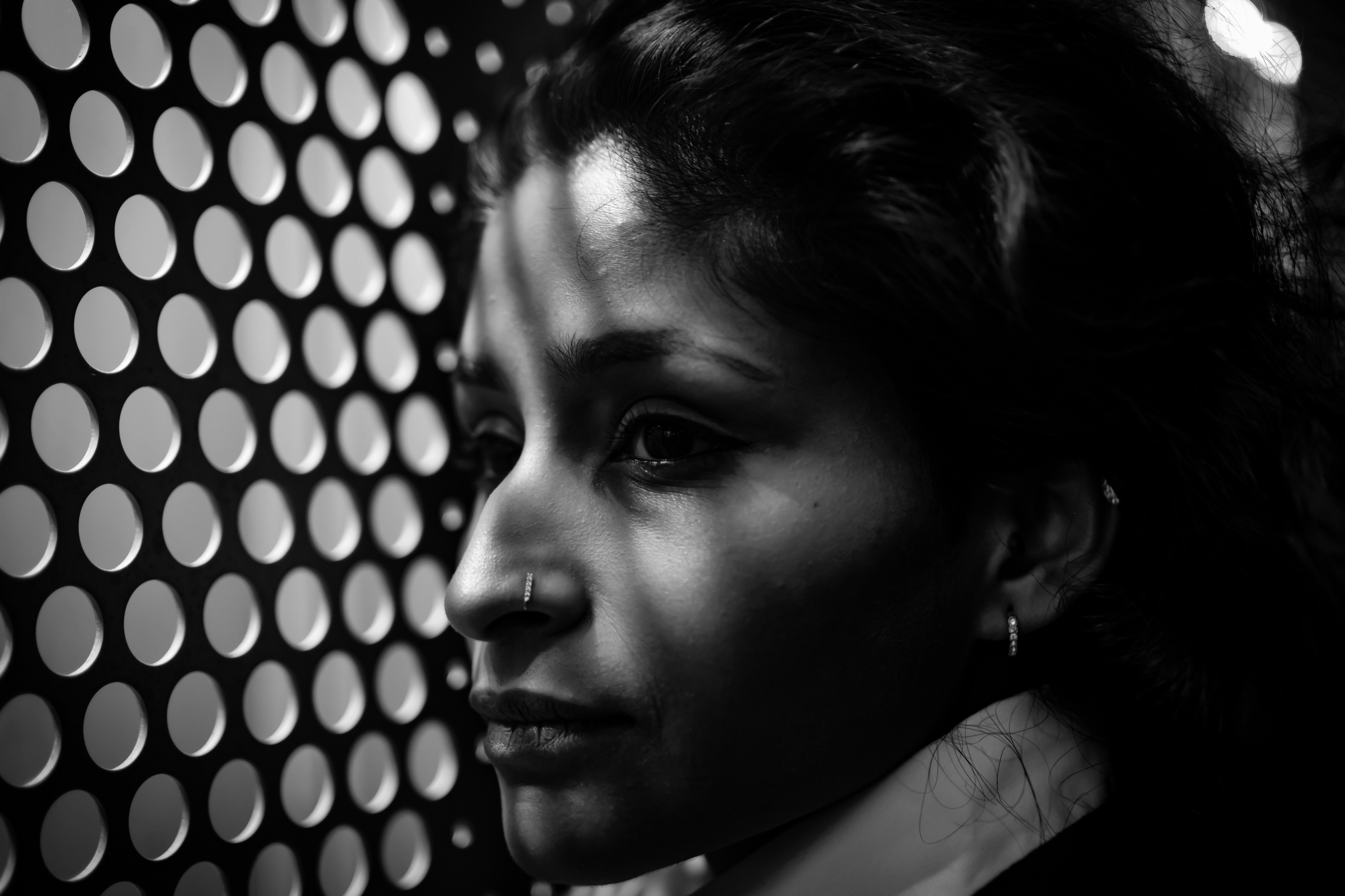 Portrait Beyond the Grid: A Quiet Moment in Dappled Light
