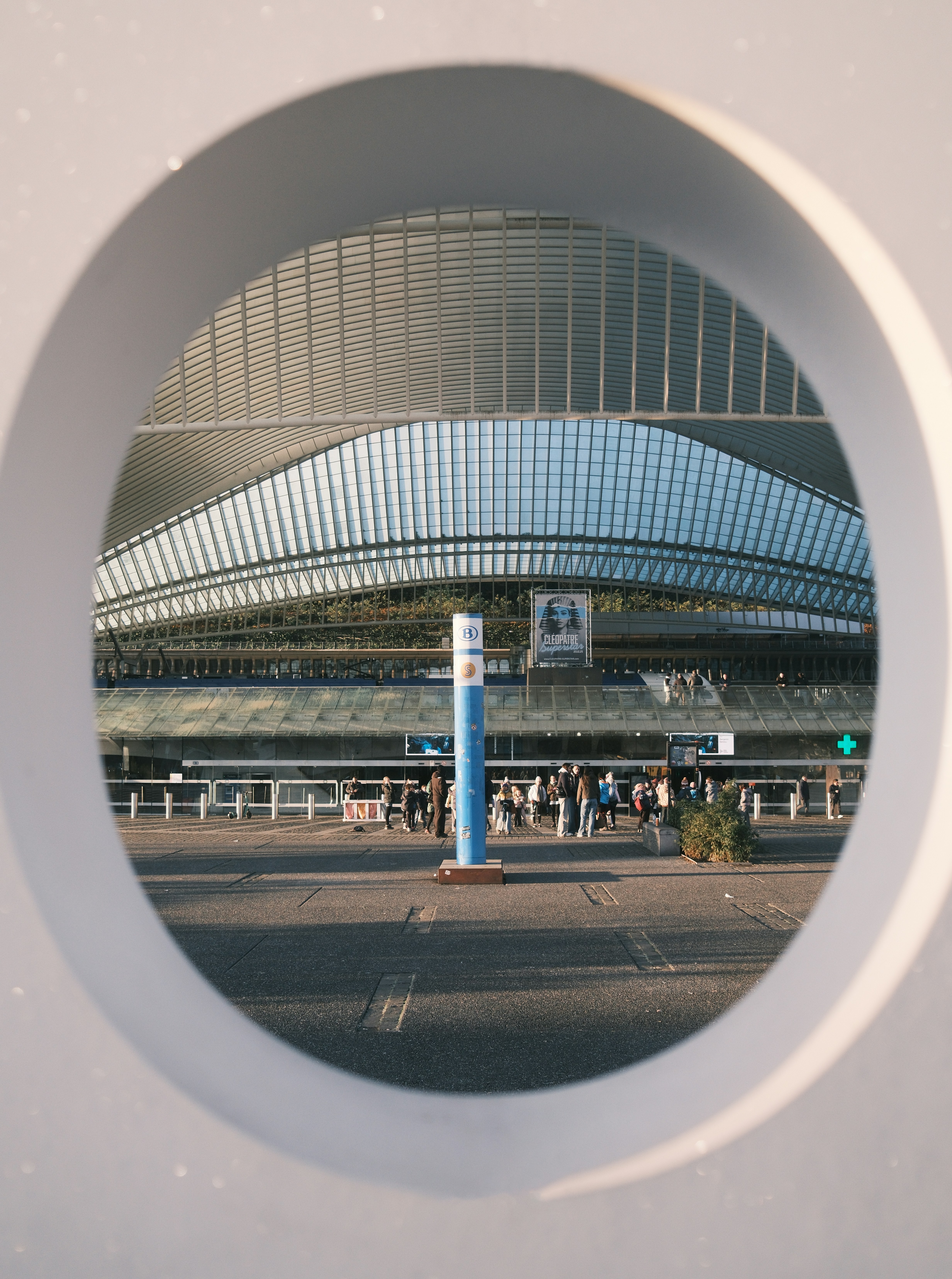 Liège-Guillemins Railway Station, designed by acclaimed Spanish architect Santiago Calatrava and officially opened in 2009, stands as one of Europe’s most breathtaking examples of contemporary architecture. Replacing a 19th-century structure, its monumental vaulted roof—constructed from 39,000 tonnes of steel and expansive glass panels—spans 200 metres without internal supports, soaring up to 35 metres high. The fluid, wave-like form evokes movement and light, bathing the five platforms and nine tracks in natural illumination. Serving high-speed TGV, Thalys, and ICE trains, the station handles
