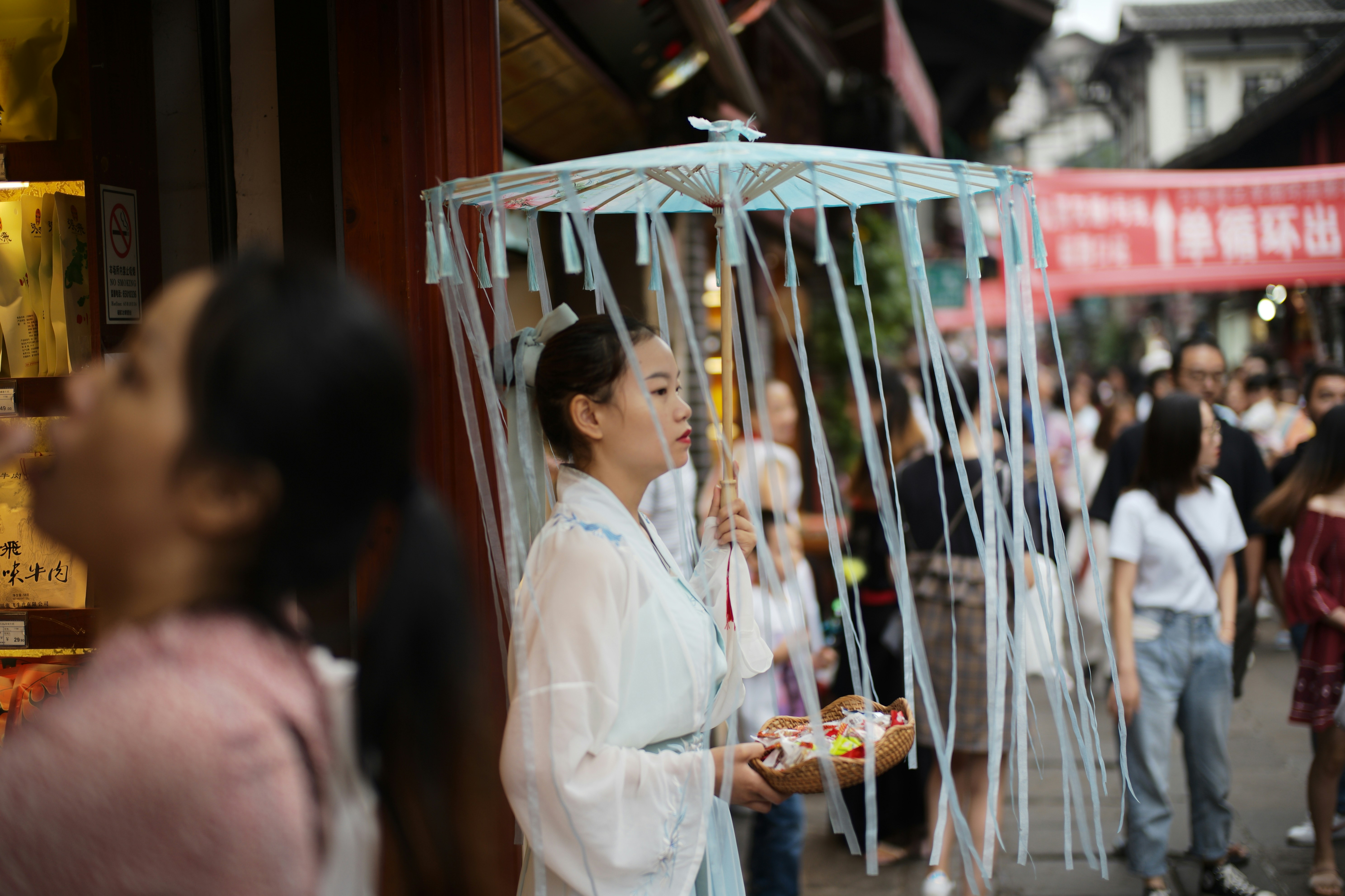 Beneath Ribbon Lanterns: A Quiet Street Portrait at Festival Time