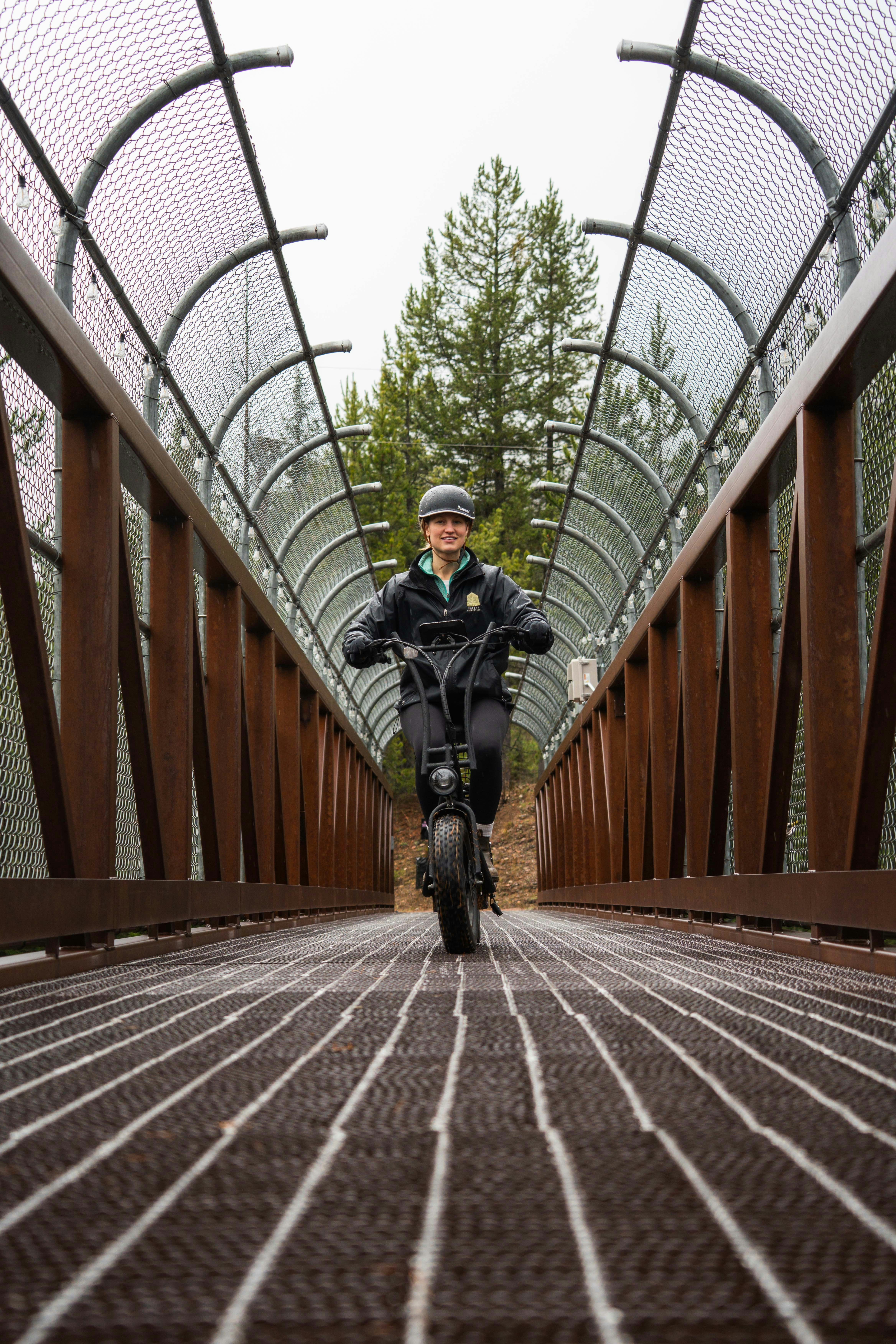 Centerline Ride on the Iron Span: A rider on a steel bridge