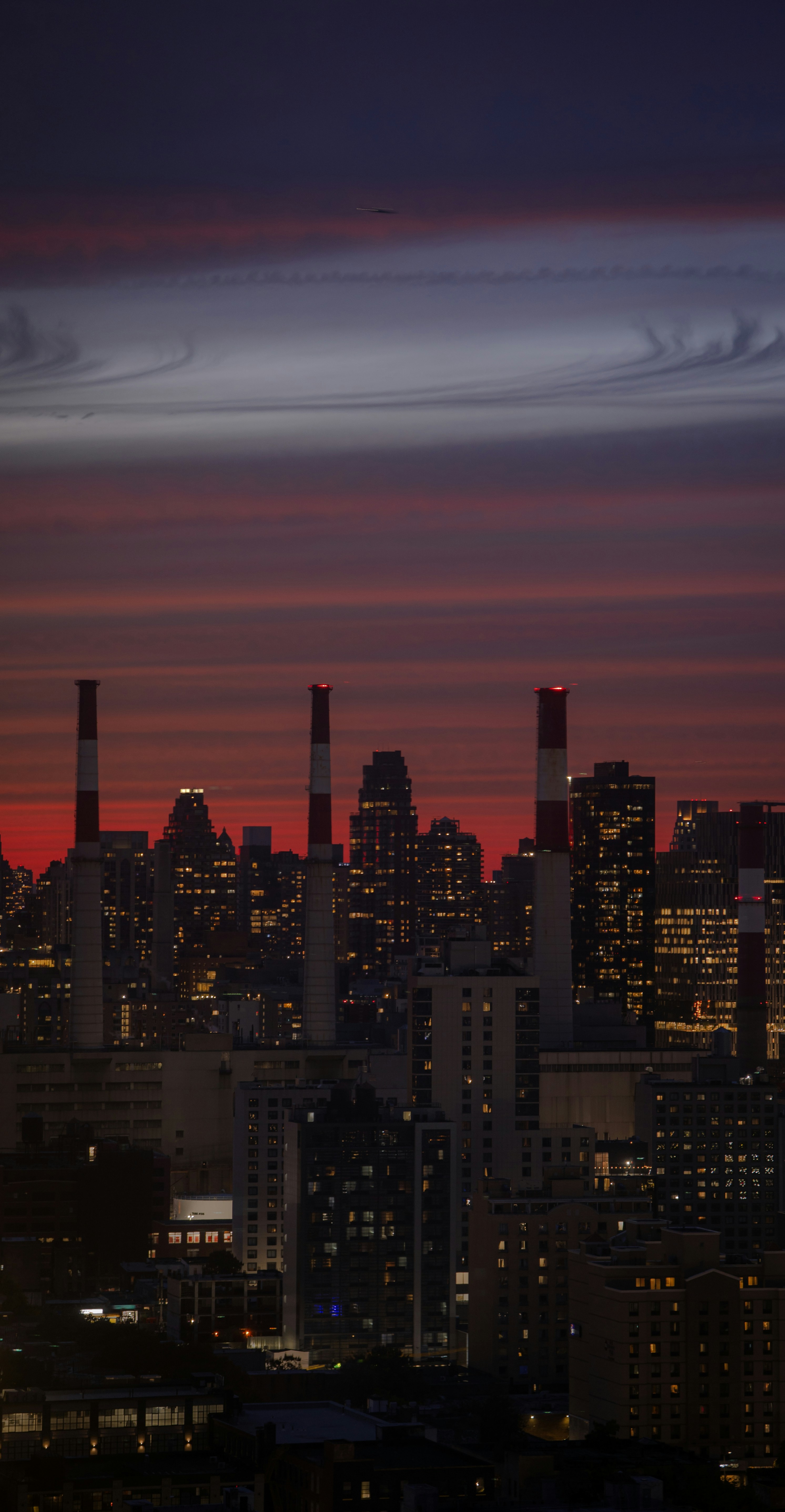 Ember-Lit Skyline: Dusk Over the Industrial Heart