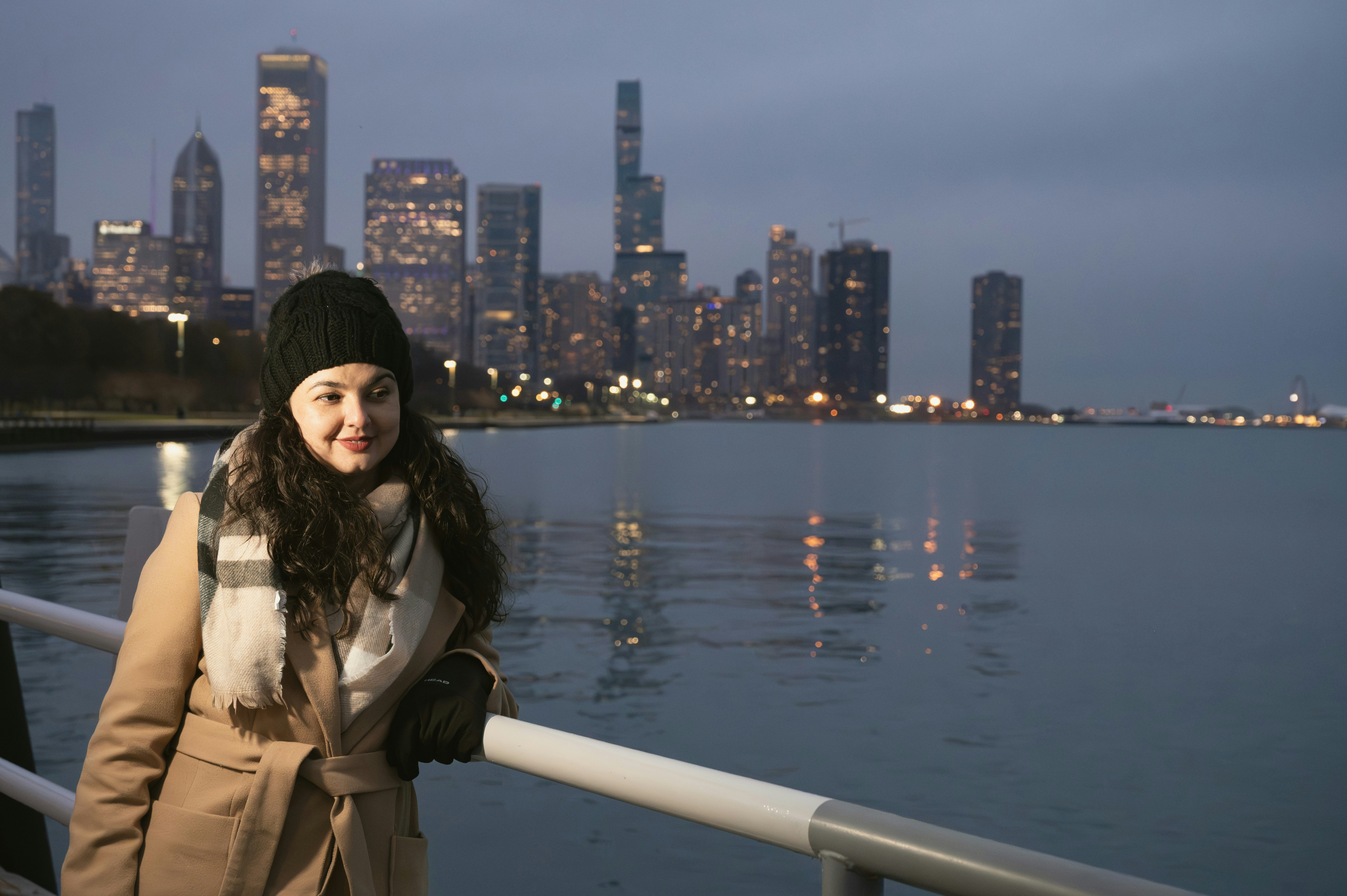 Harbor Lights and a Warm Coat: Portrait by the Riverfront