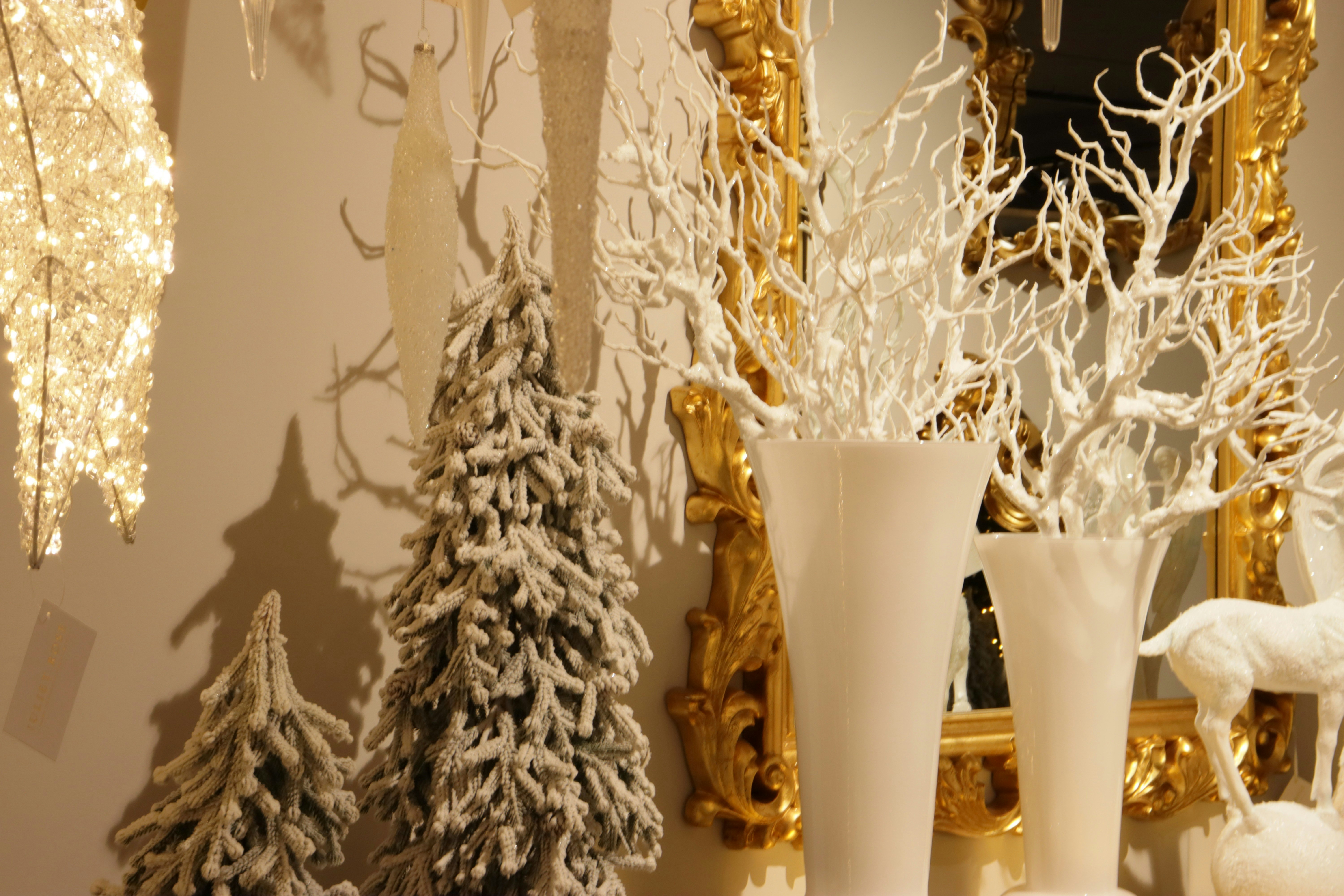 Gilded Still-Life: Snow-Dusted Pines and Ivory Branches Framed in Gold