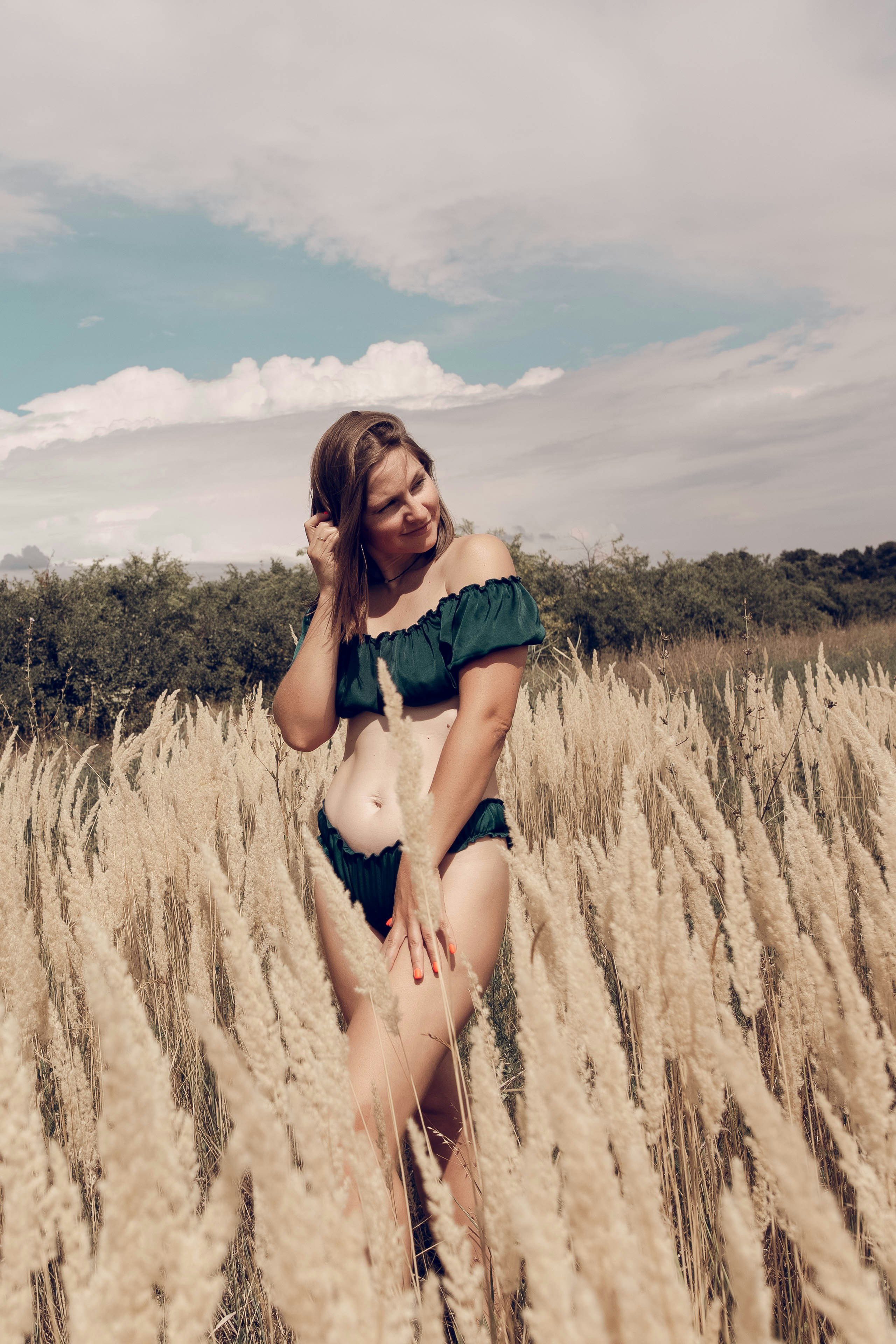 Young beauty woman on a field