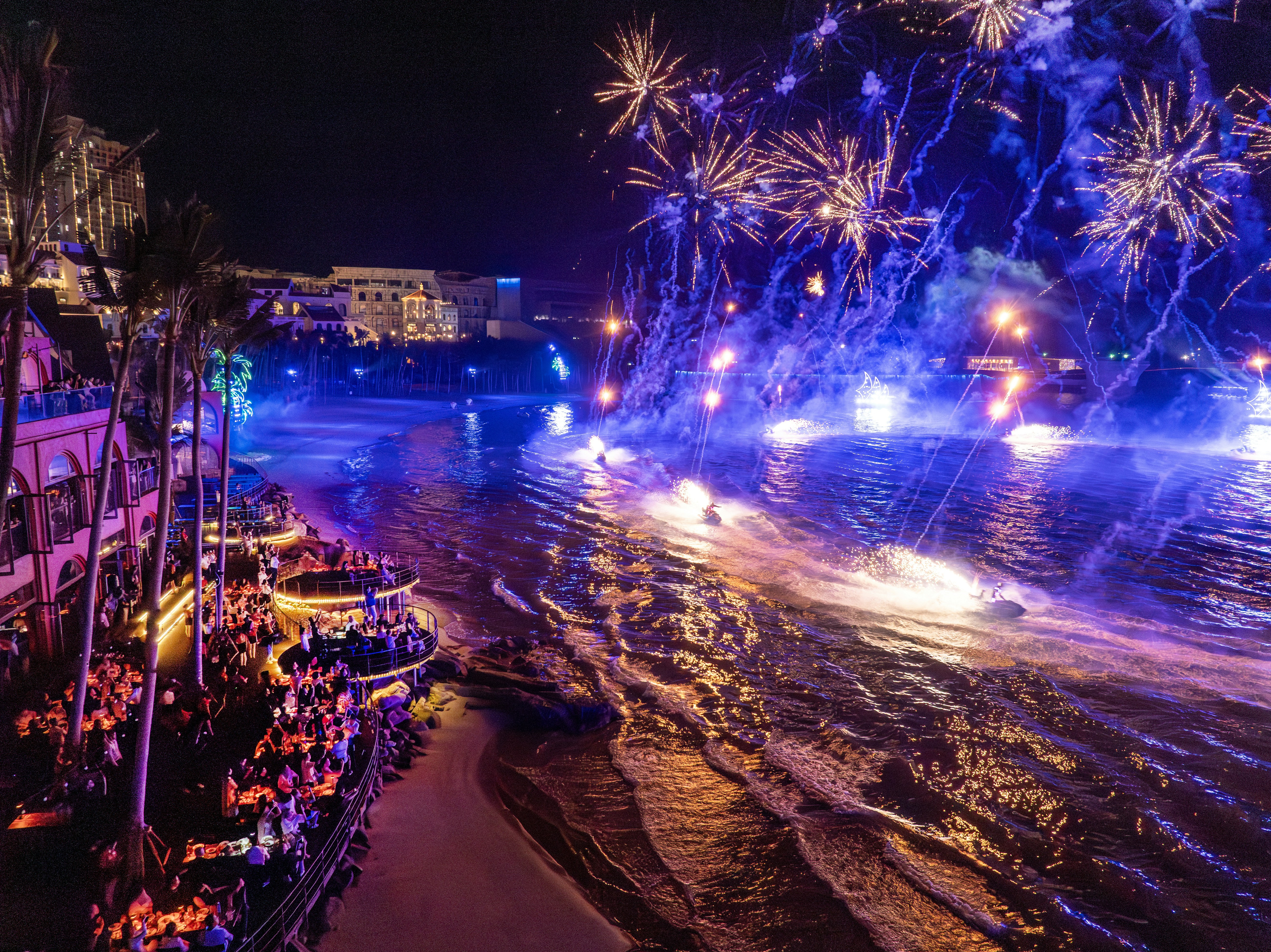 Neon Fireworks Over the Riverfront: Boats, Lights, and Night Splash