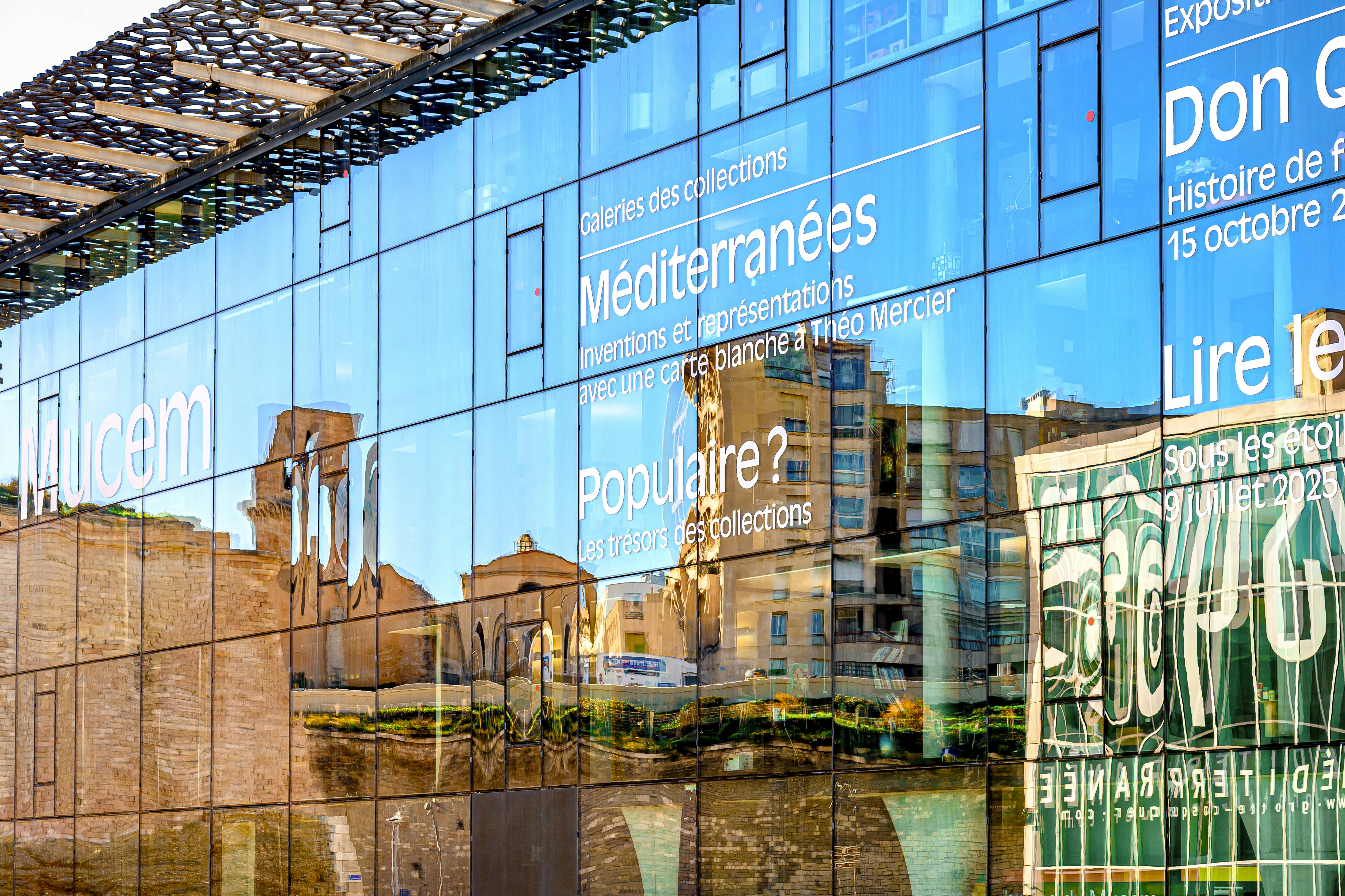 Blue Glass Facade, Brick Reflections: Mucem in View