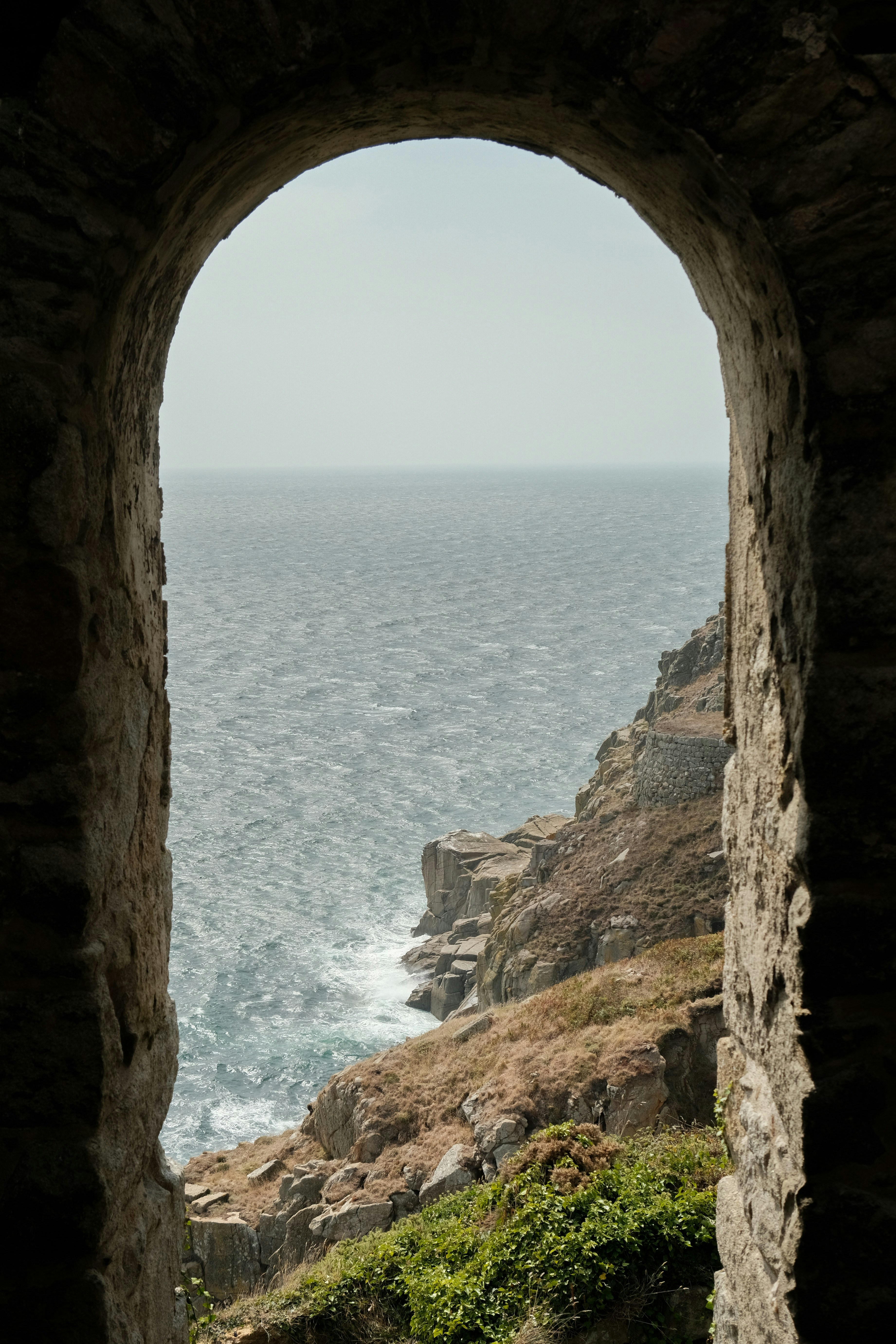 Horizon Framed by a Weathered Arch