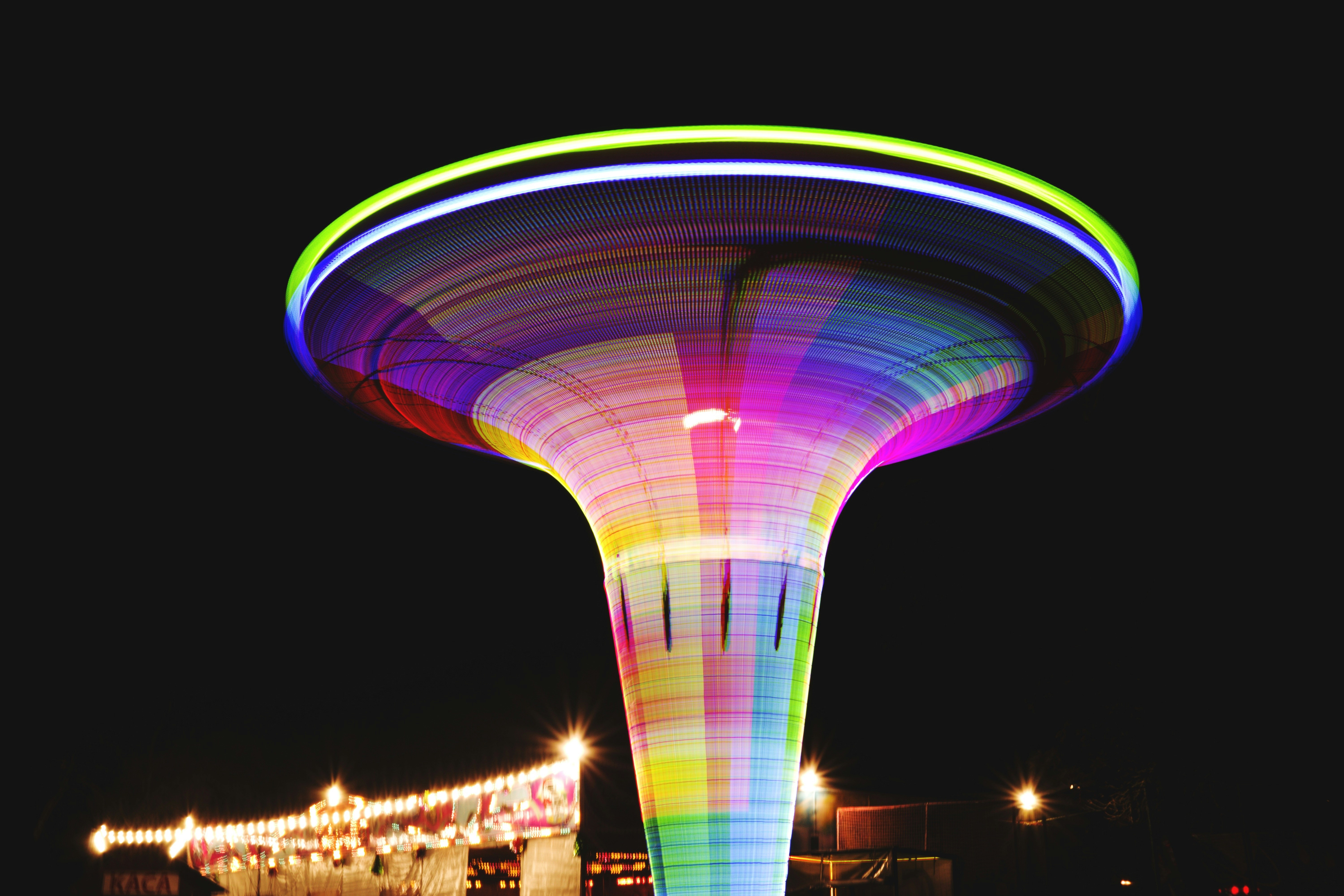 Colorful water tower illuminated at night with lights photo – Free ...