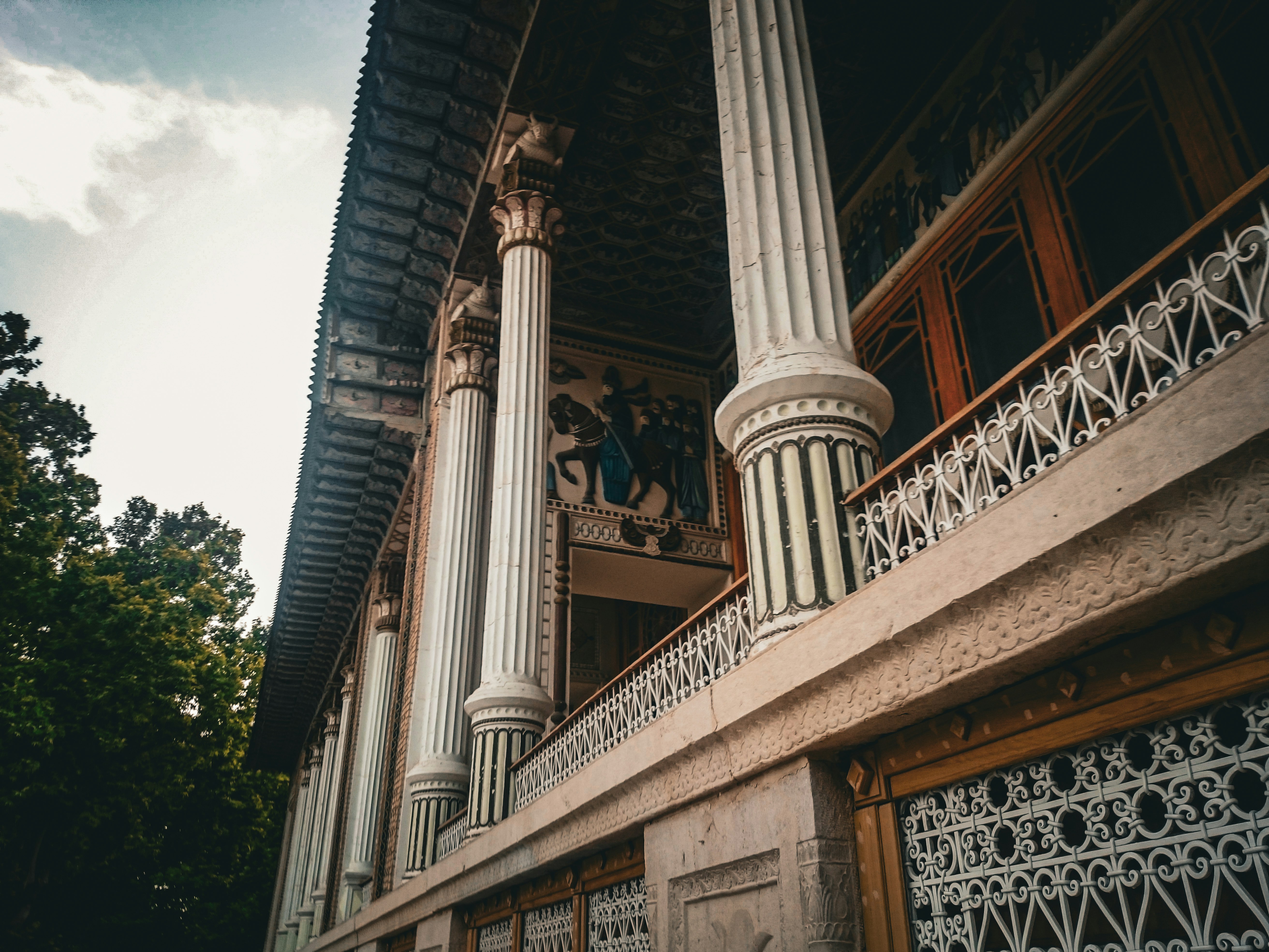Grand Iwan View — Afif-Abad Garden — May 16, 2015 (#0045) Captured on May 16, 2015, this image showcases the majestic Iwan (porch) of the Afif-Abad Garden in Shiraz. The perspective highlights the impressive scale of the architecture, featuring tall columns inspired by ancient designs and a wooden ceiling adorned with traditional paintings. The play of light and shadow emphasizes the depth and historical significance of this royal residence. Sony Xperia Z1 (C6903) • 4.9 mm • f/2.0 • 1/100 s • ISO 50 Full-res download: mofaeye.com/45 (link in bio)