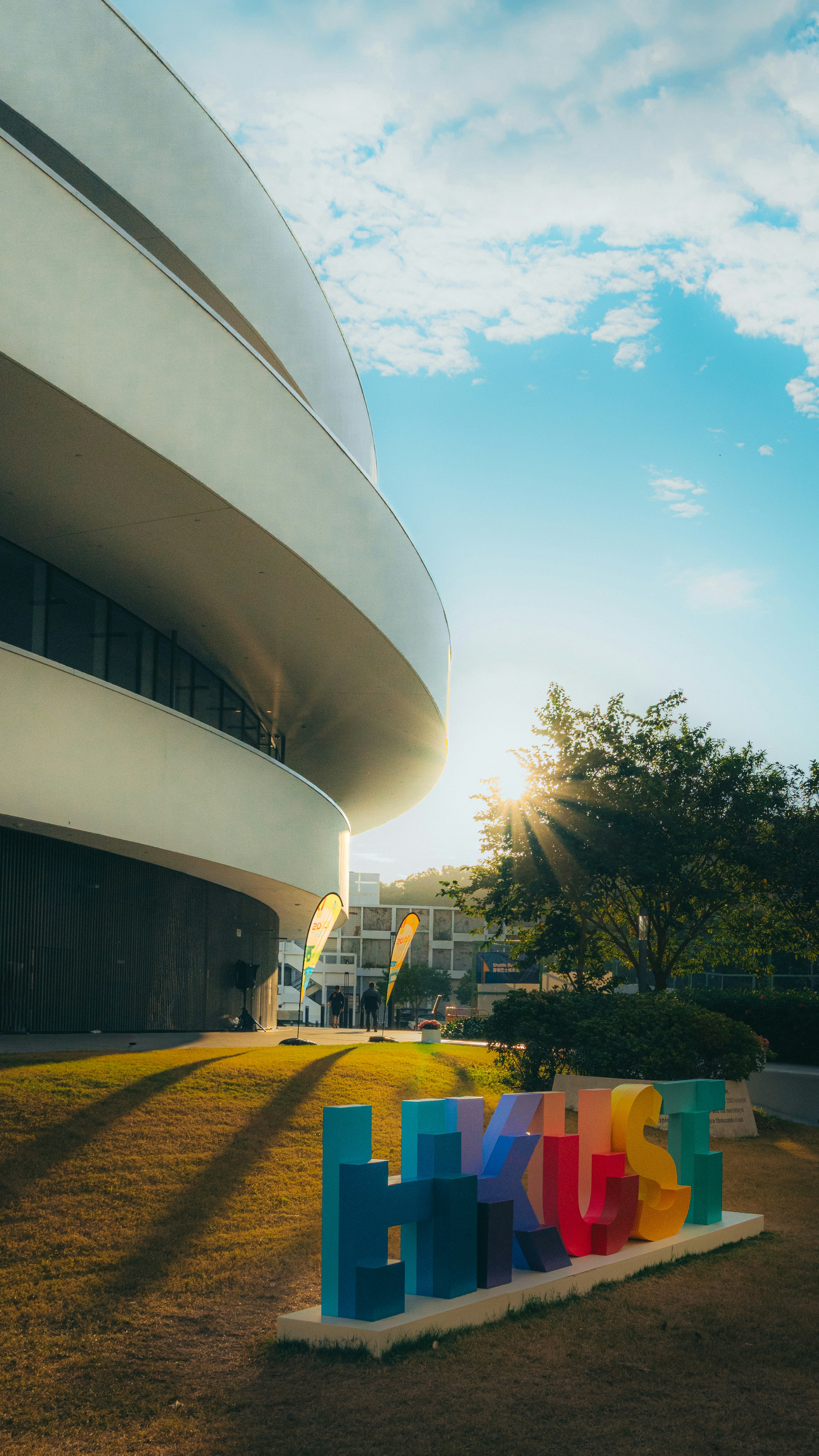 Arc of Light Over a Curved Campus