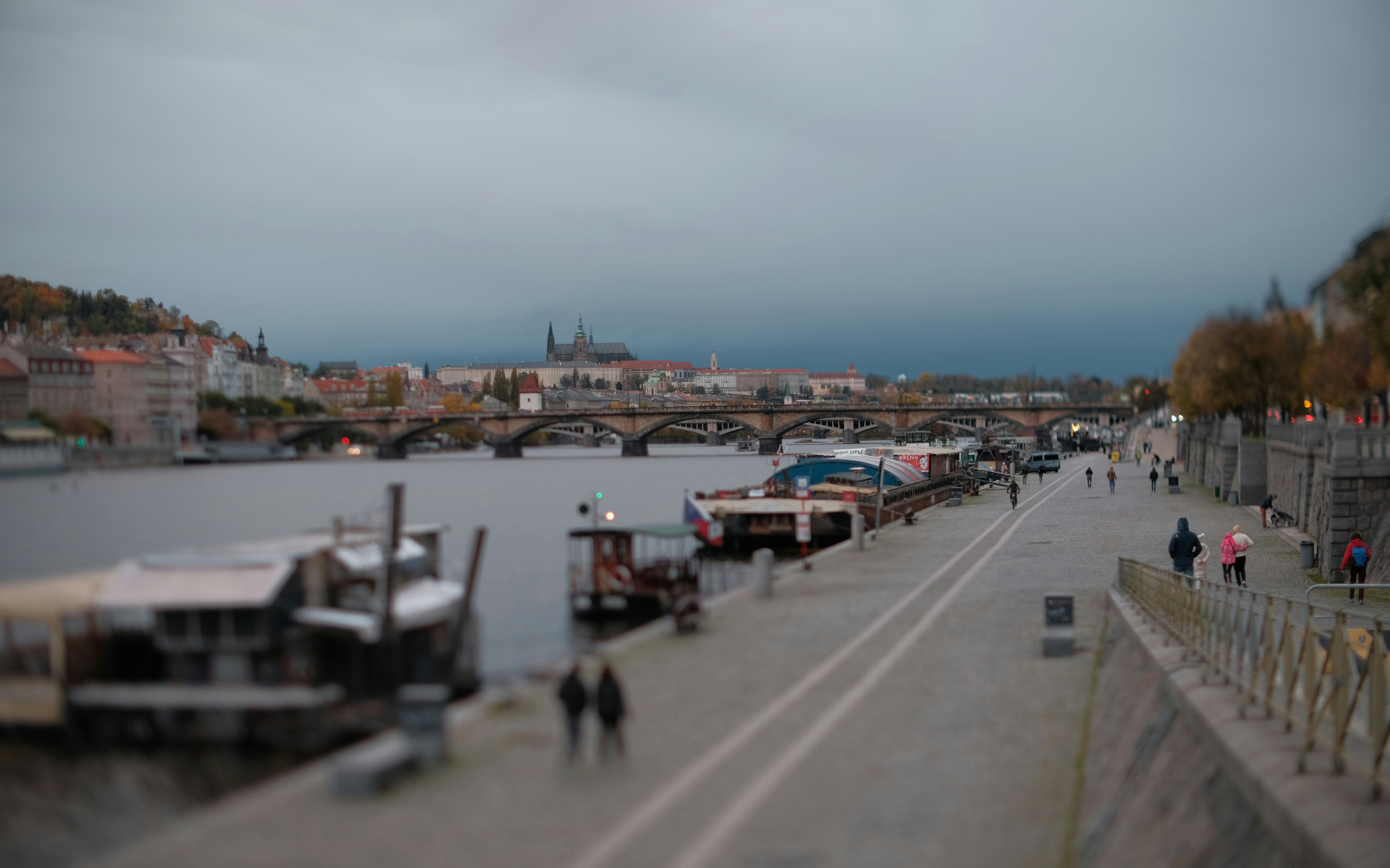 Distant Cathedral at the Edge of a Quiet European Riverwalk