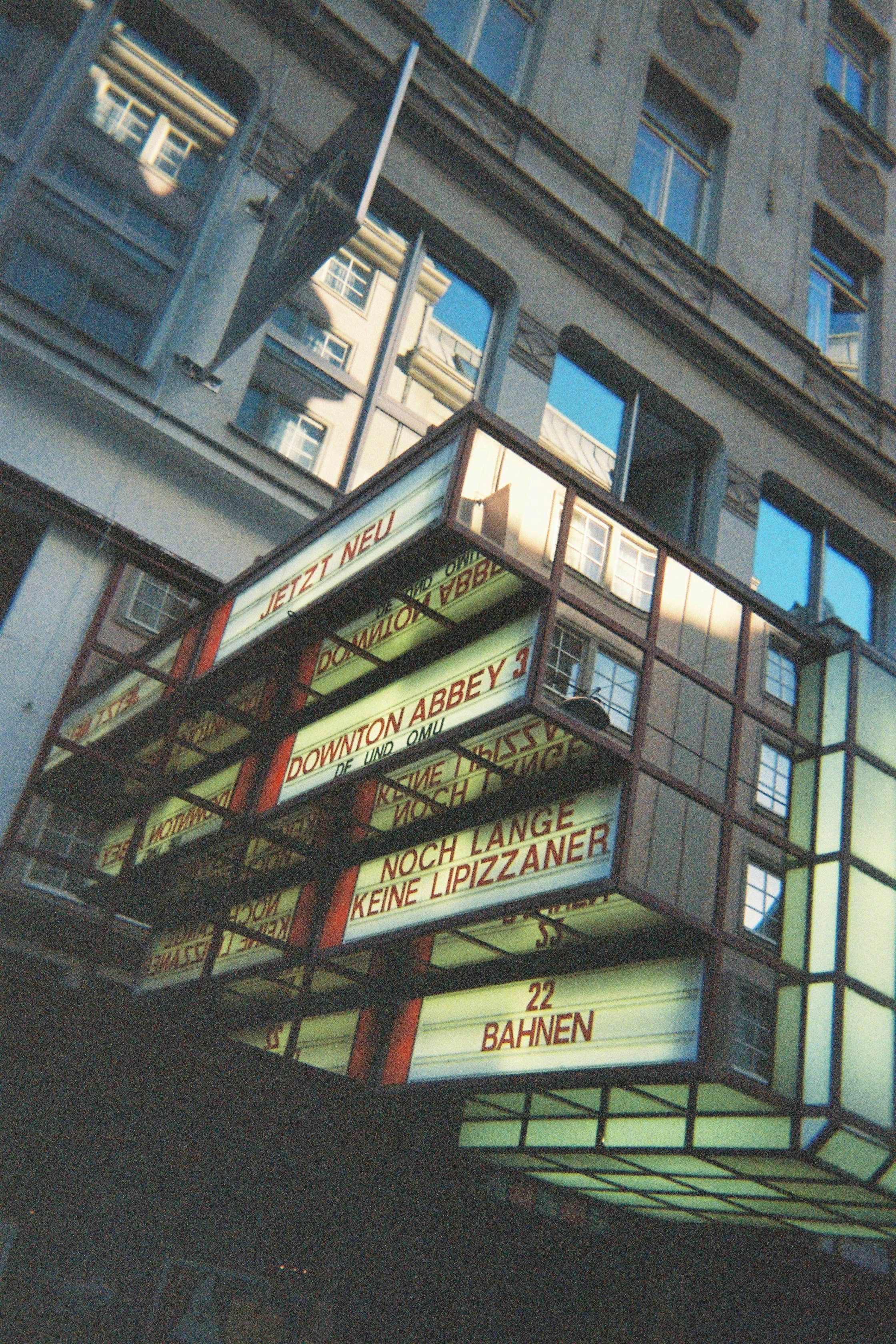 Modern building facade with illuminated signs photo – Free Travel Image ...