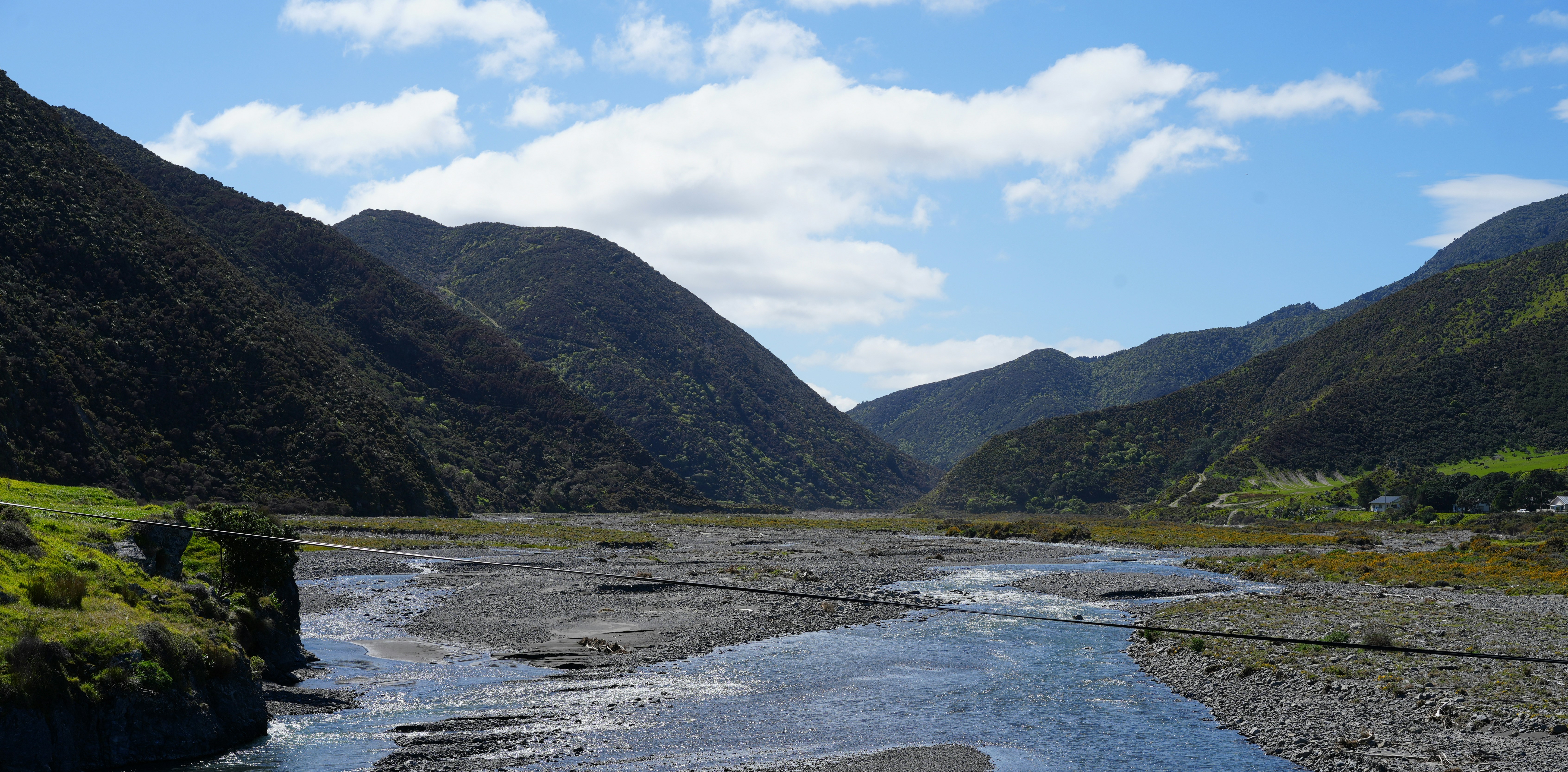 River Path Through a Quiet Alpine Gorge