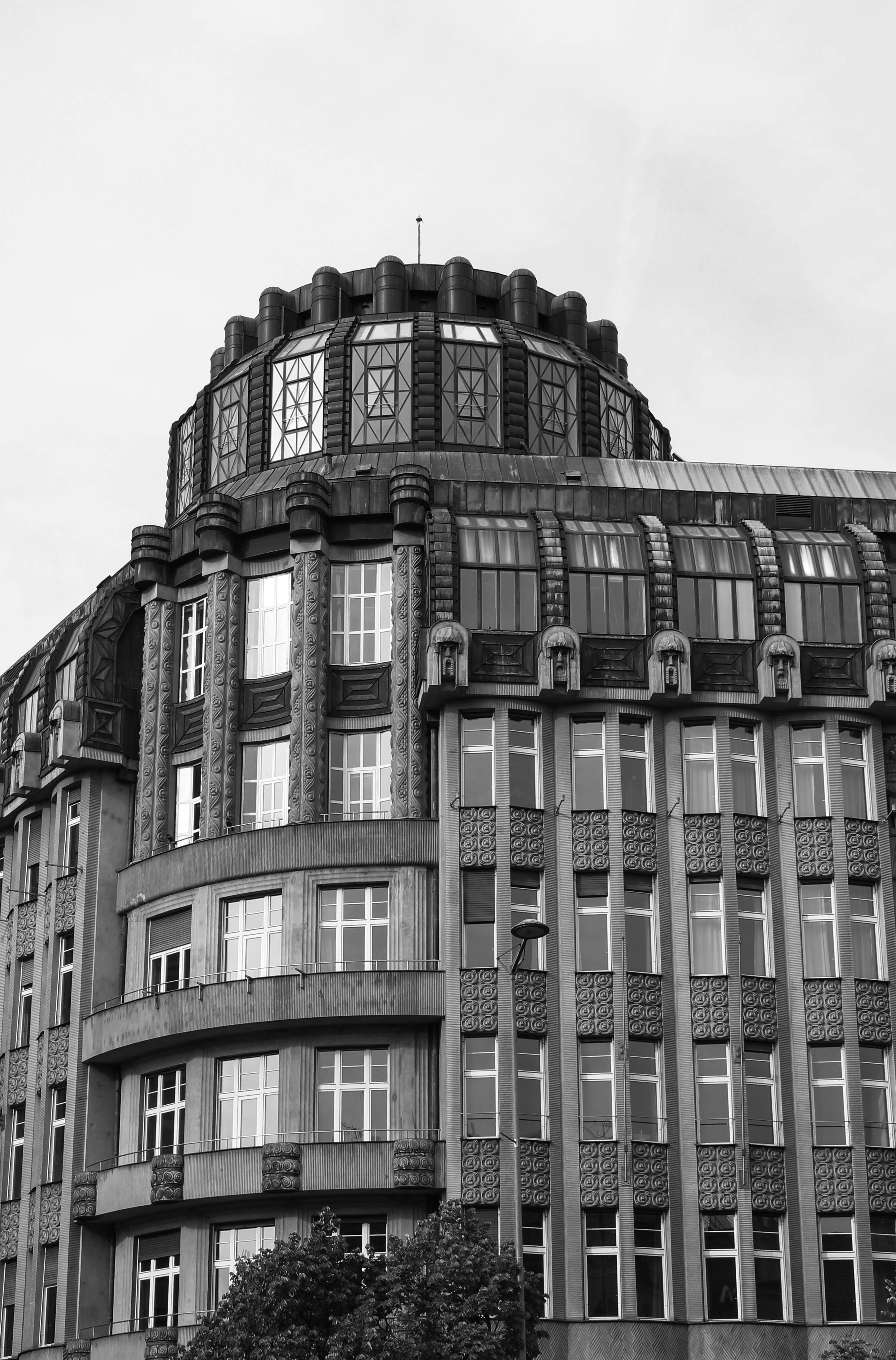 Dome Crown: Circular Summit Amid Vertical Brickwork