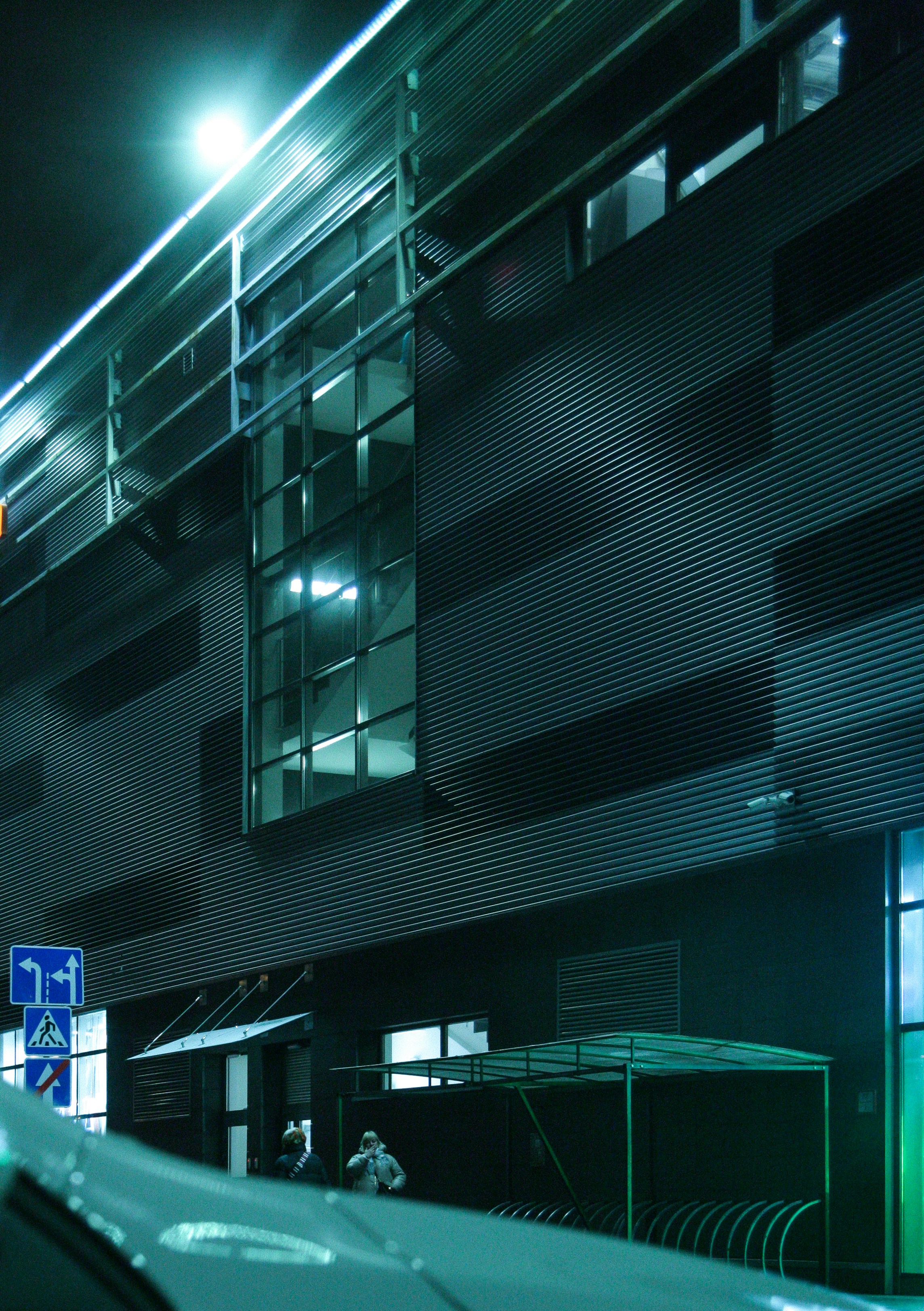 Modern building facade illuminated at night