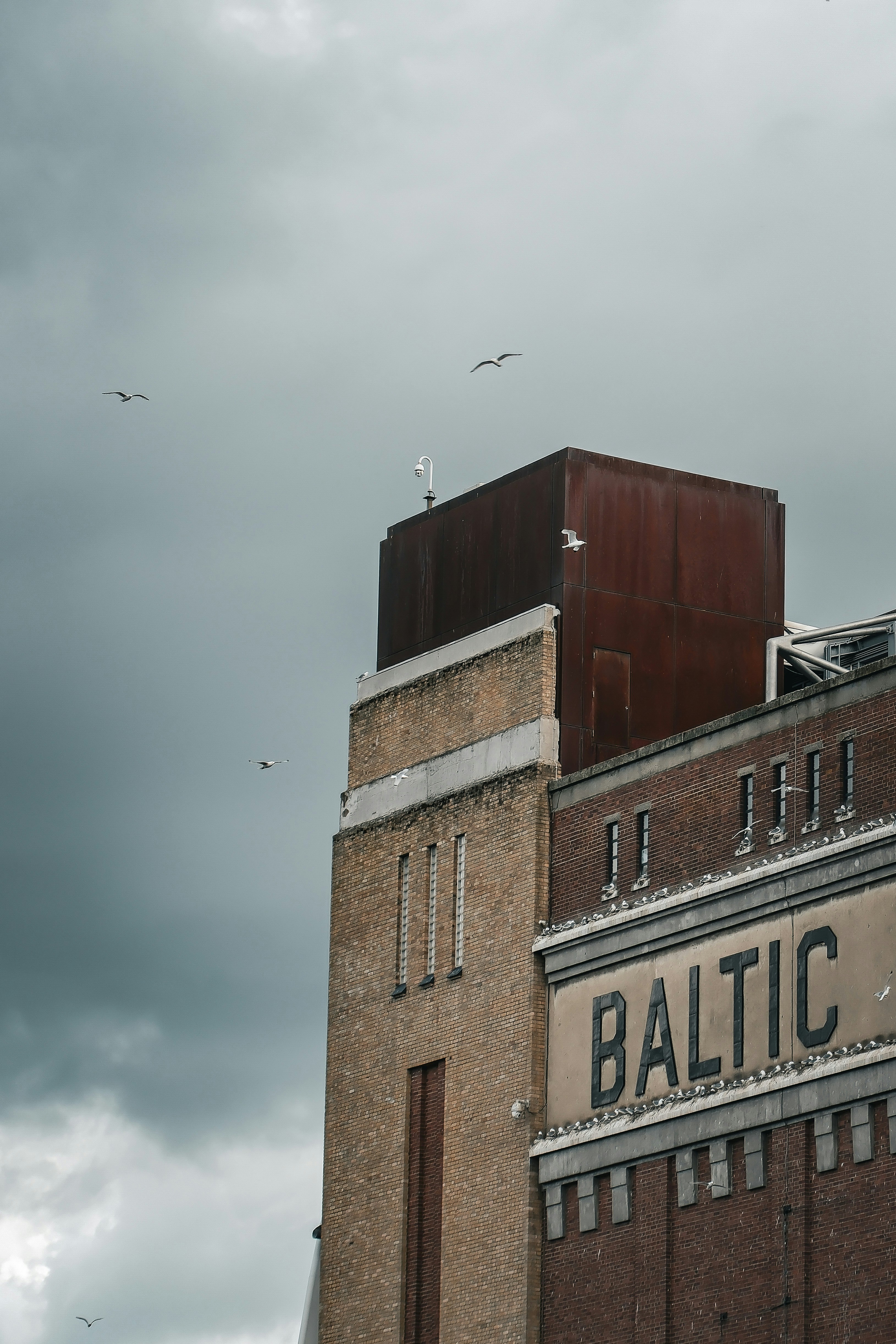Baltic Brickwork Under a Stormy North Sky