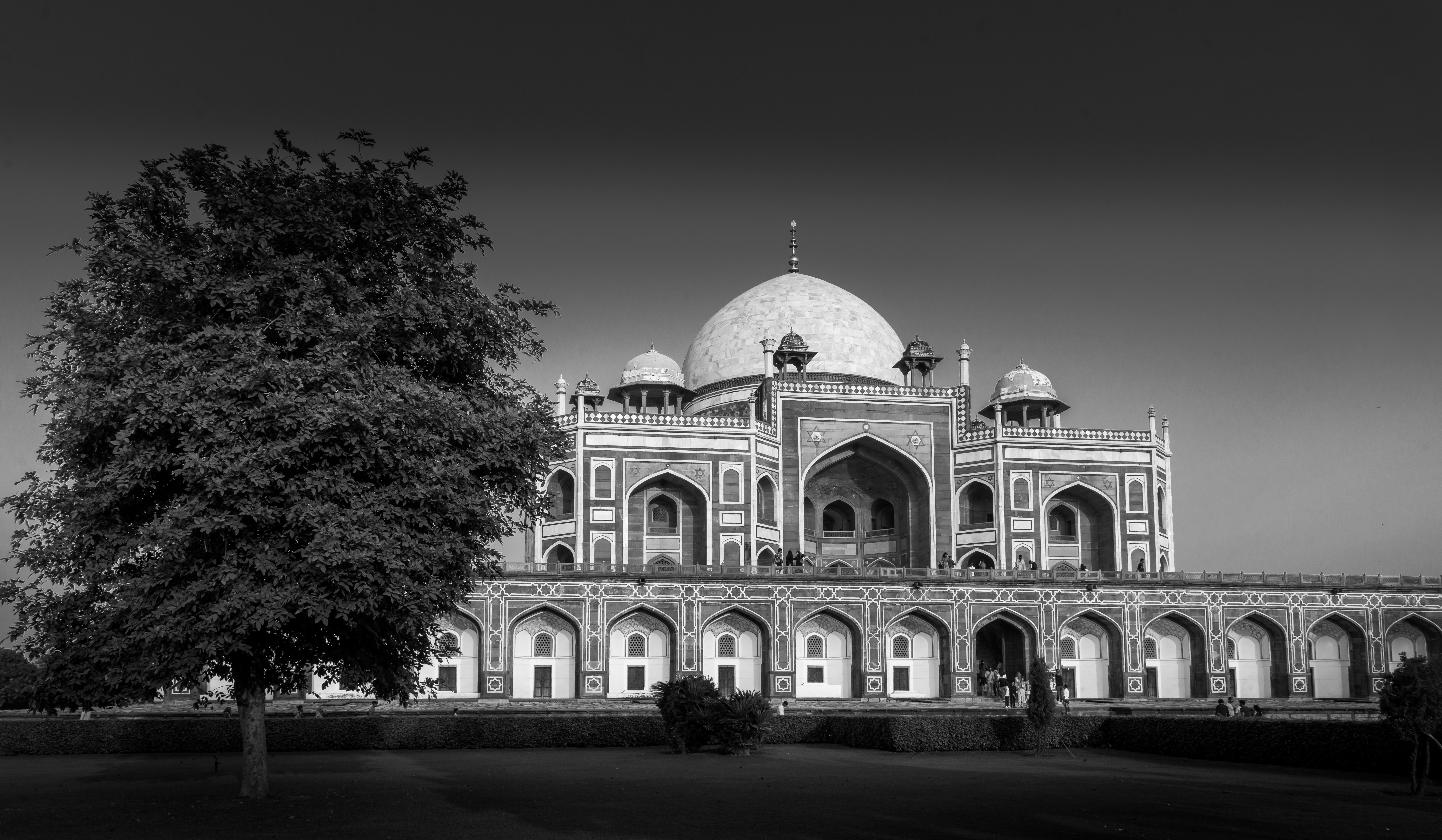 Humayun's Tomb is a UNESCO World Heritage site in Delhi, India, built for the Mughal Emperor Humayun by his widow, Bega Begam (Haji Begam), in the 1560s. The tomb is an early and magnificent example of Mughal architecture, featuring a Persian-inspired charbagh garden design and is noted as a precursor to the Taj Mahal. It is located near the Nizamuddin Dargah and was constructed by Persian architects Mirak Mirza Ghiyath and his son, Sayyid Muhammad.