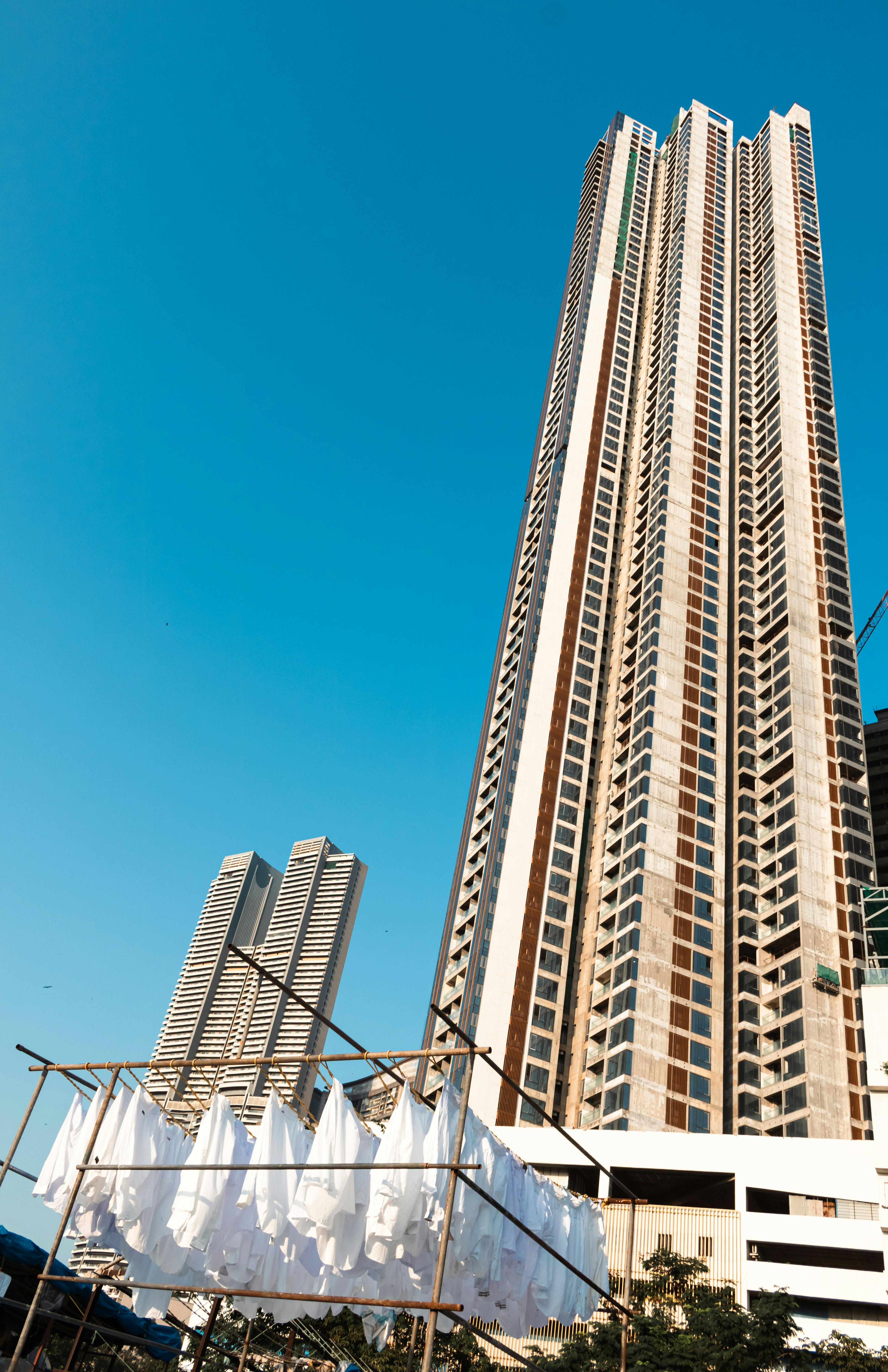 Skybound Towers: A Leaning Climb toward the Blue