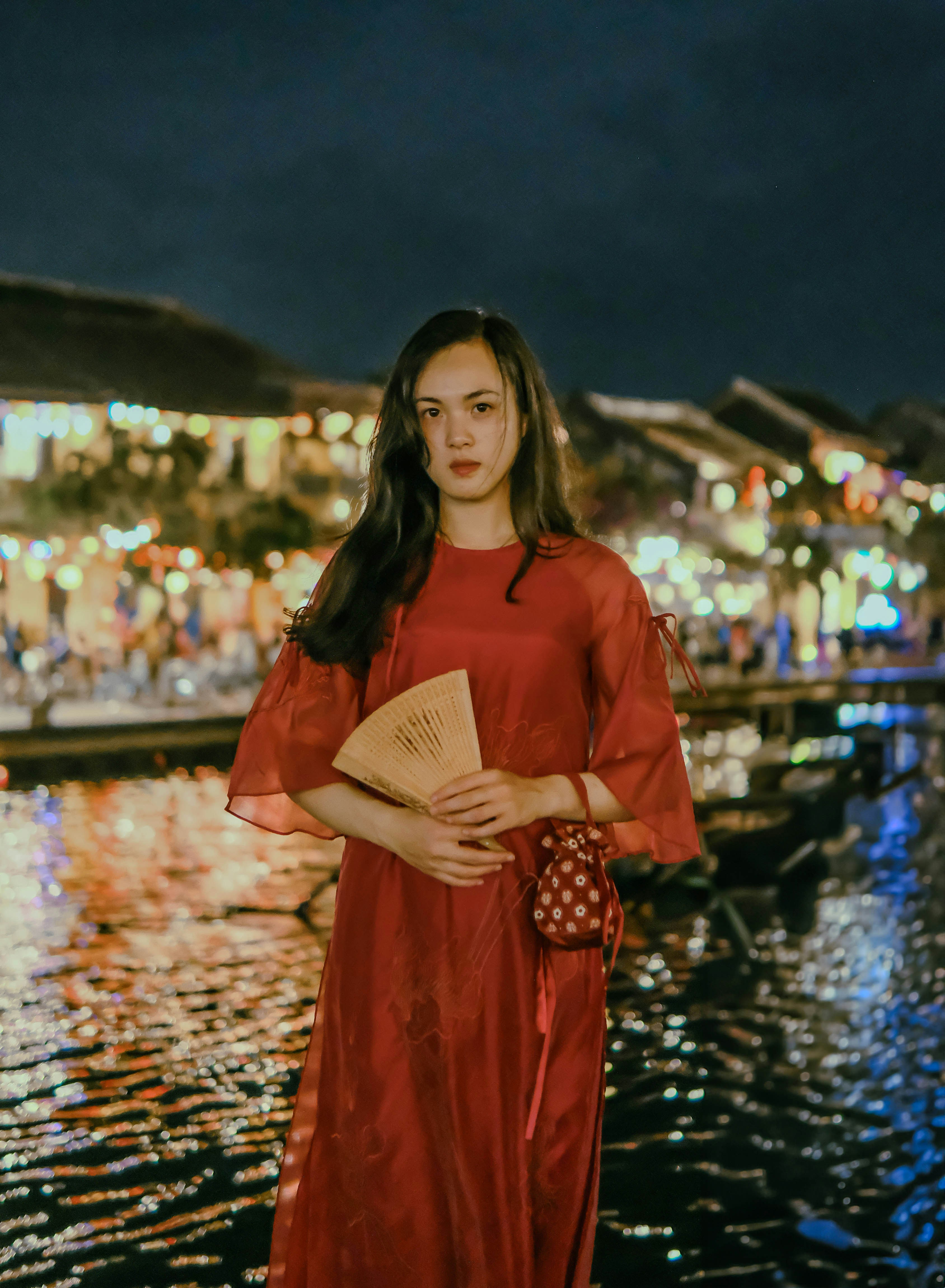 Crimson Silk by Lantern Light at the Riverfront