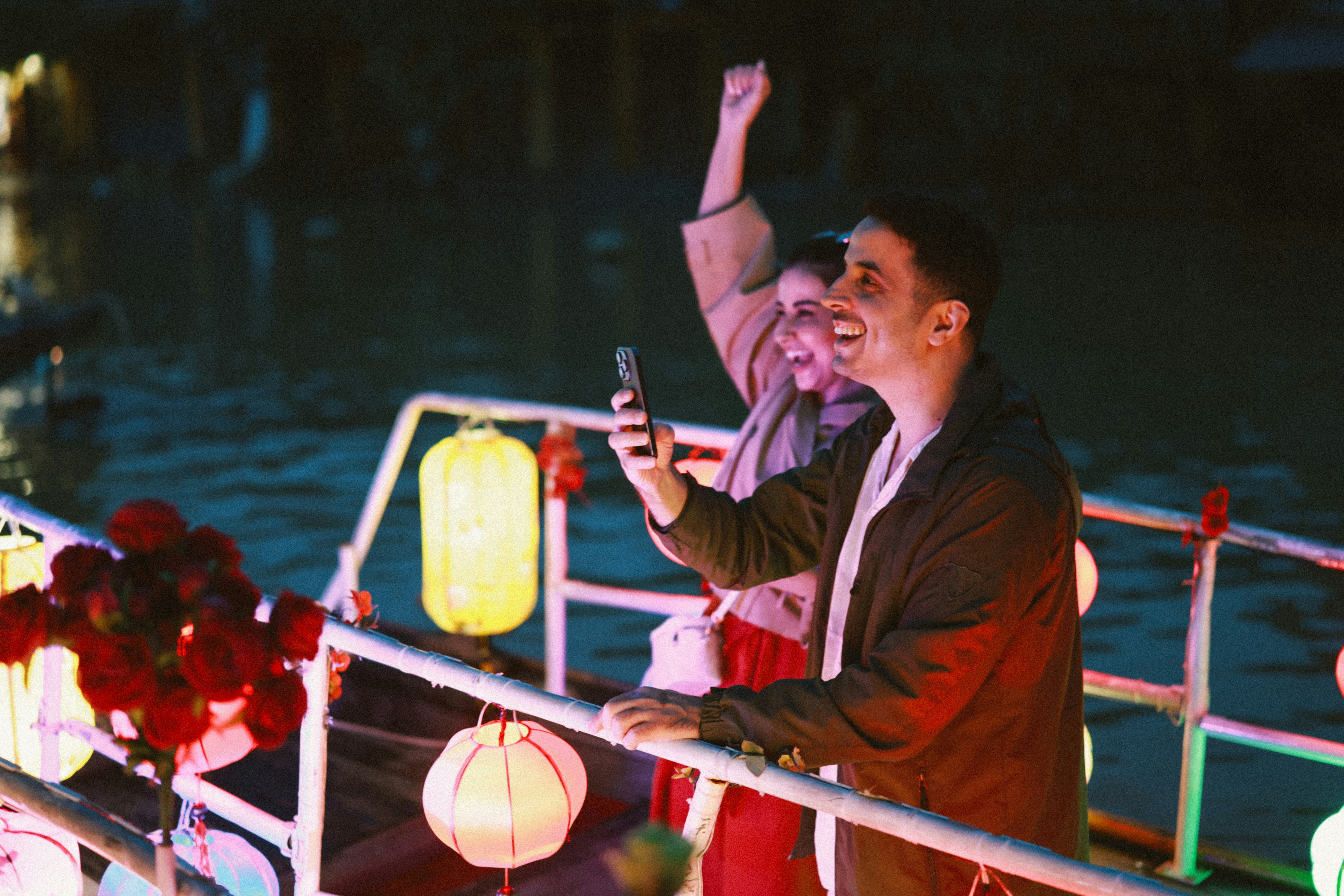 Midnight Harbor Selfie: Lantern Glow and Shared Laughs on the Deck