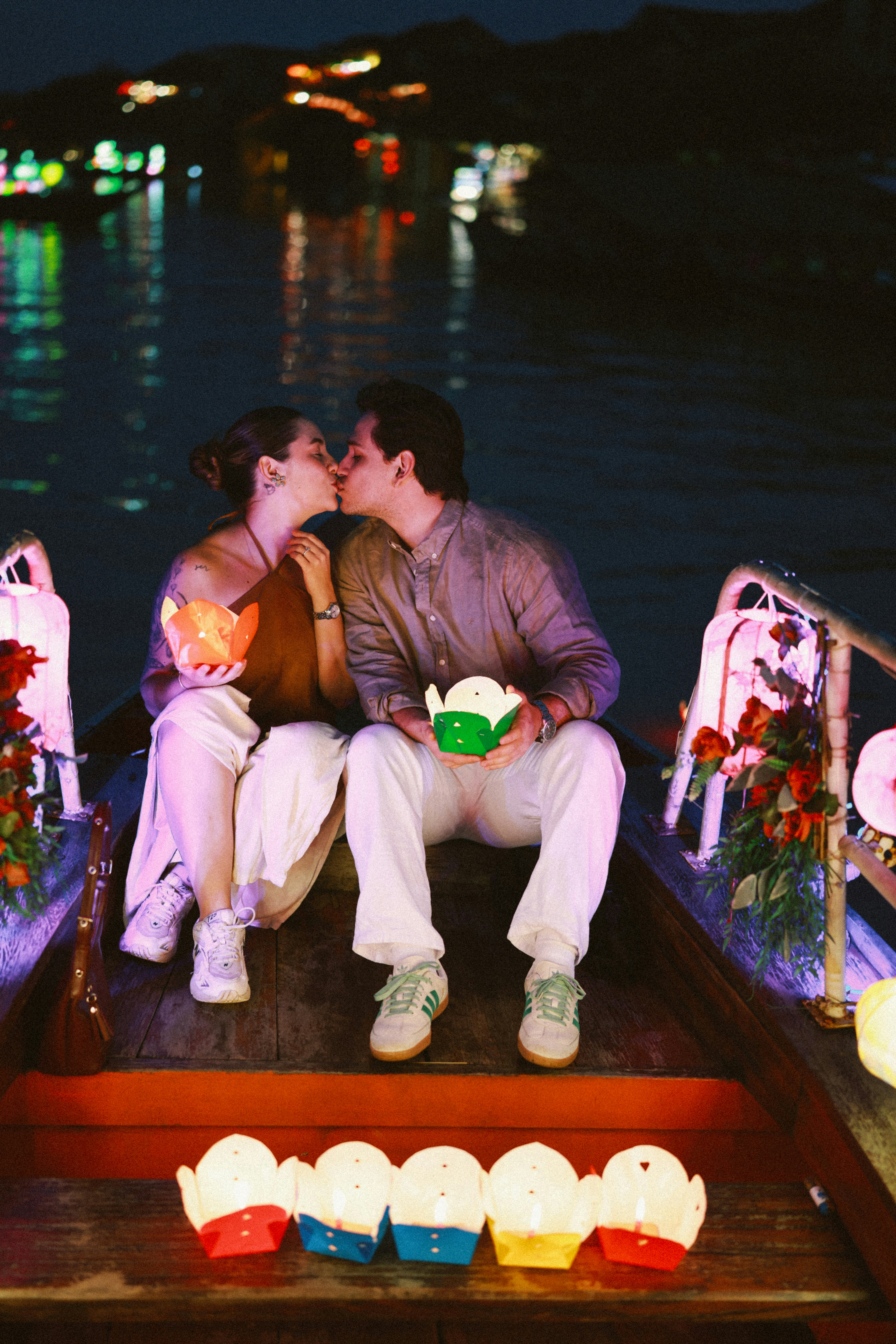 Kiss Beneath Lanterns on a Quiet Floating Boat