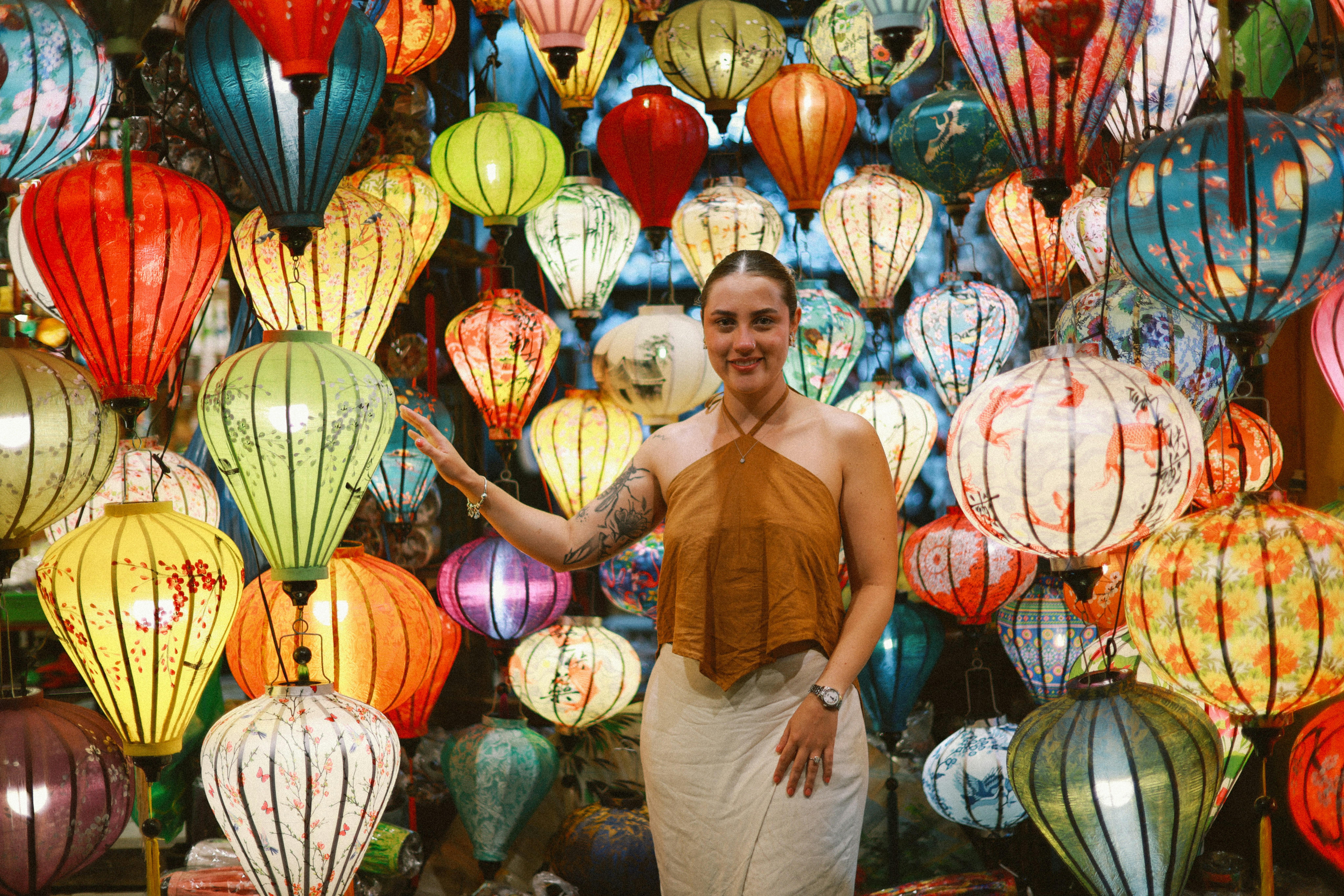 Portrait Amid a Sea of Lanterns in a Colorful Market