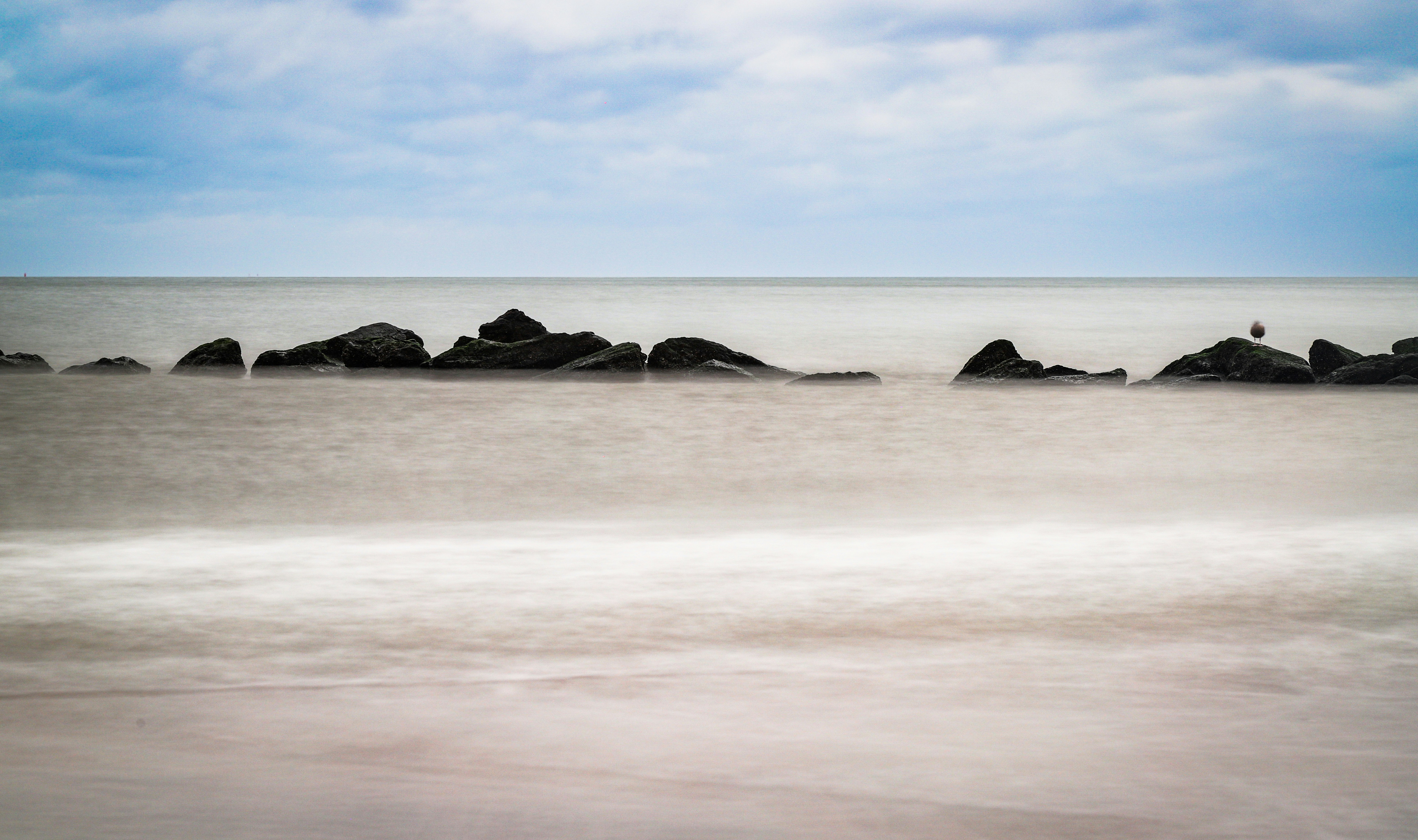 Horizon of Stones: A Quiet Long-Exposure Seascape