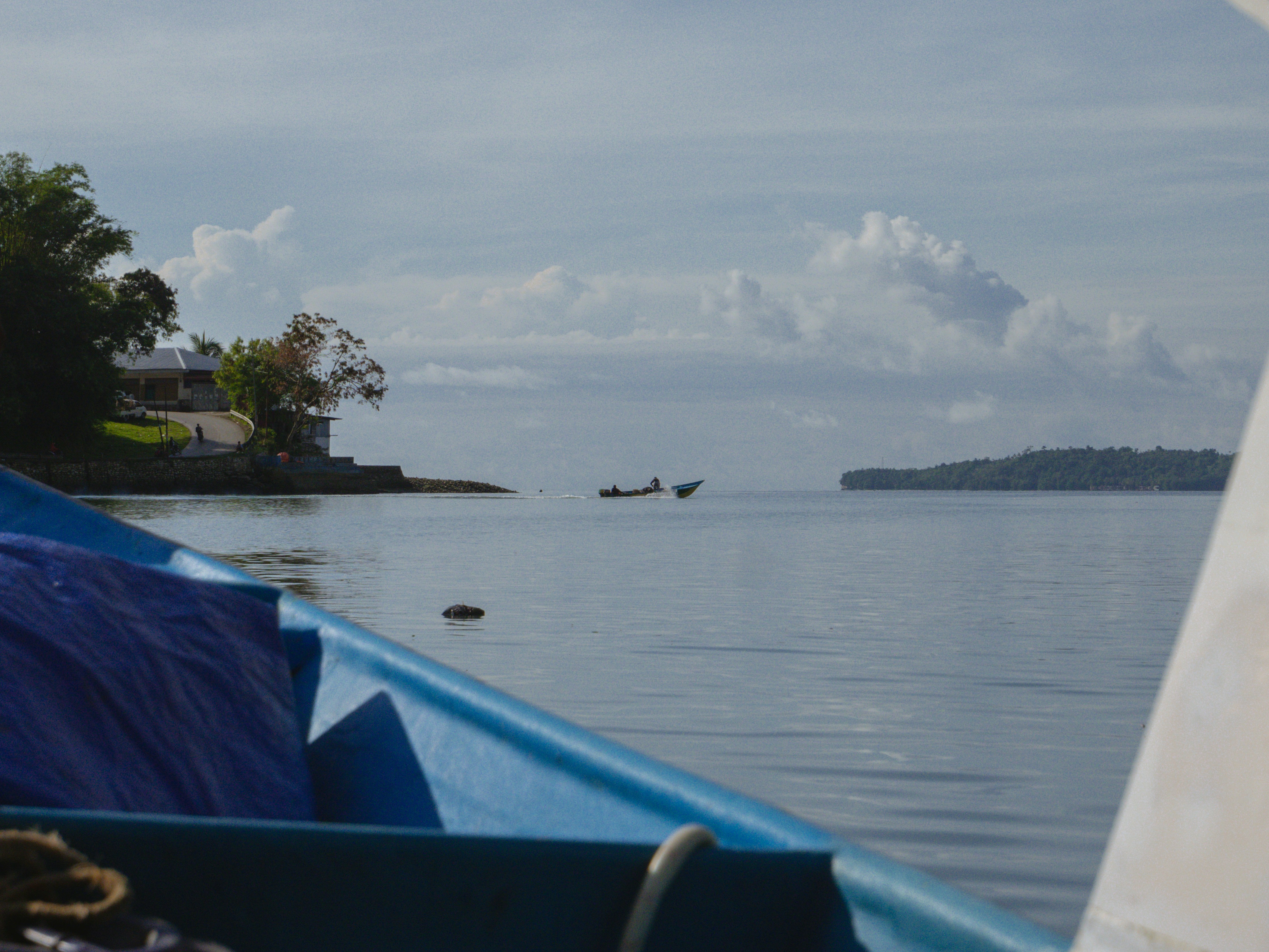 Blue Boat Foreground, Quiet Horizon