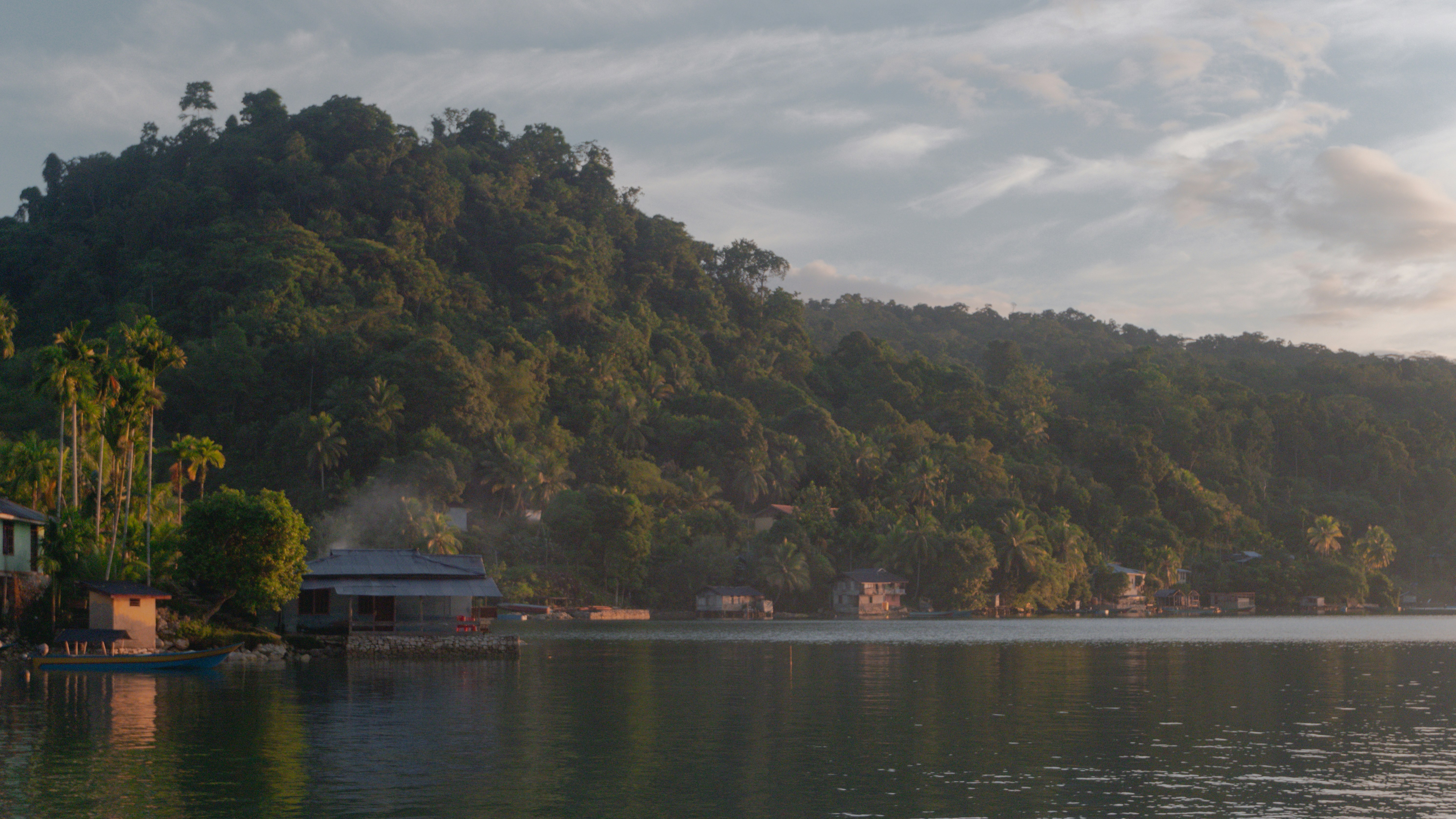 Hillside Veil Over a Glassy Lake at Dusk