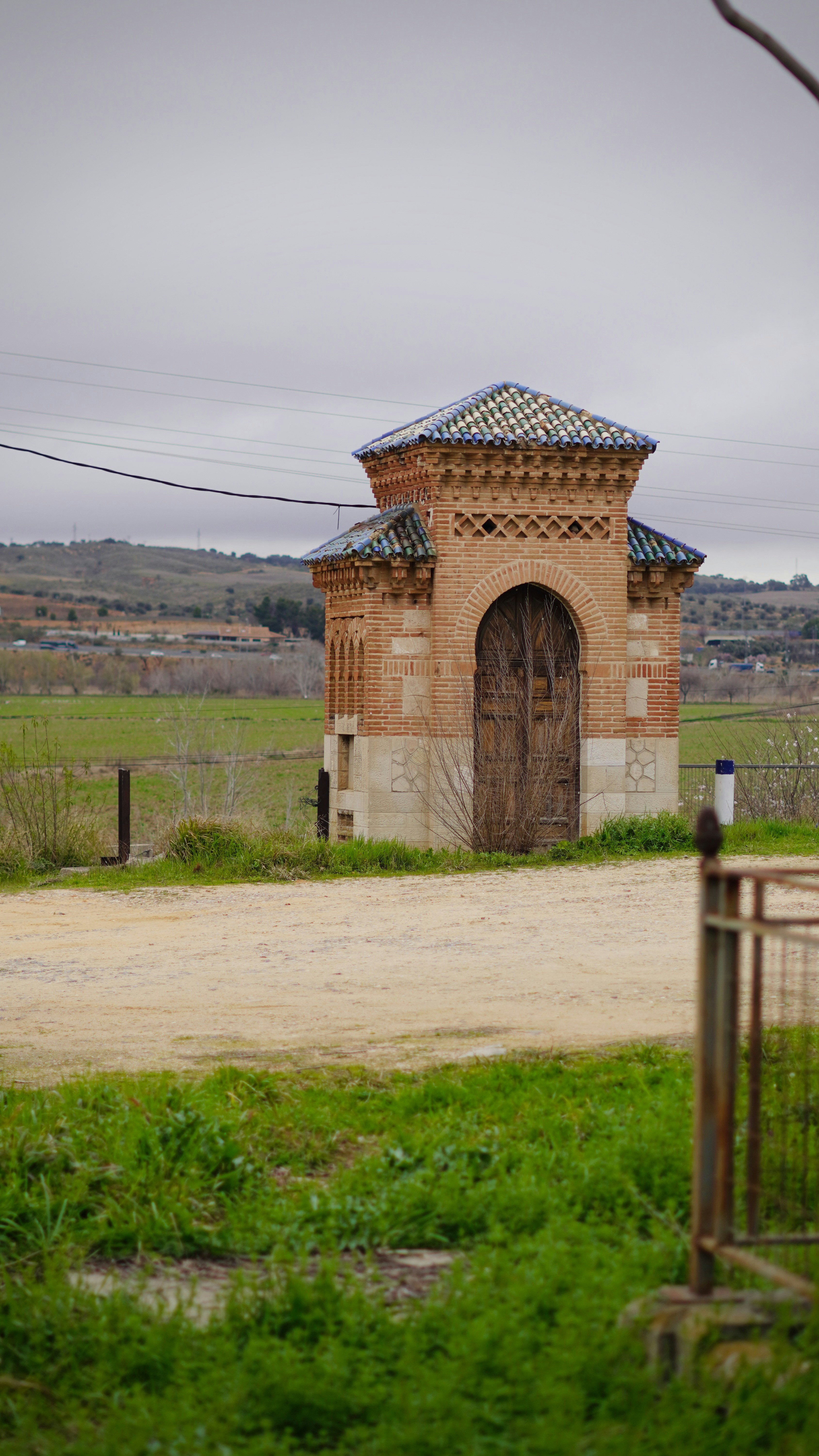 Brick Gatehouse on the Quiet Plain